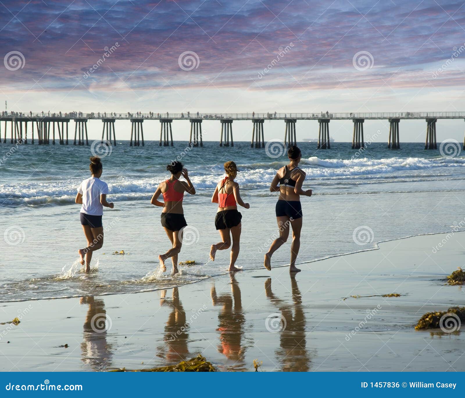 A run to the pier stock photo. Image of beach, active - 1457836