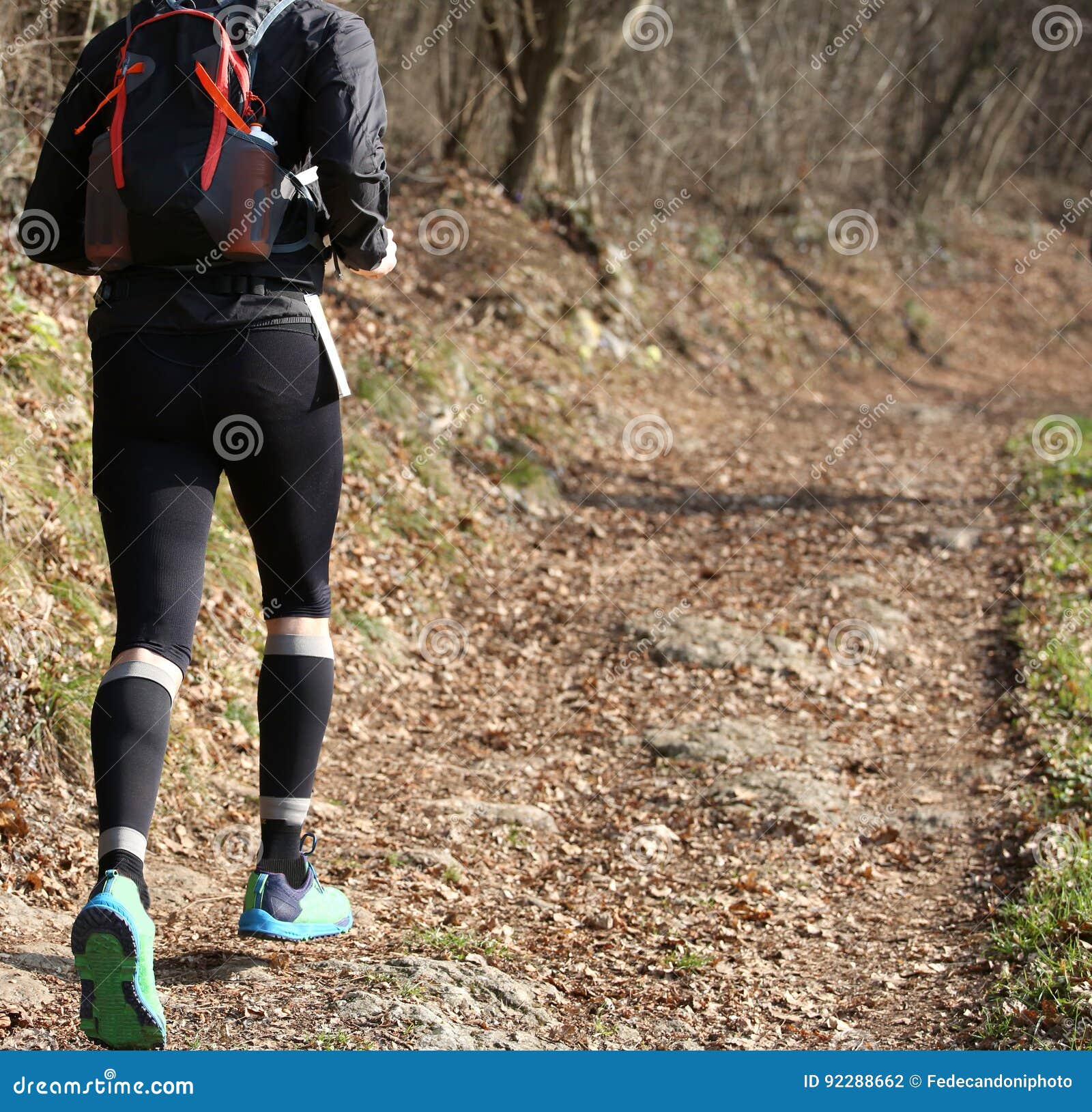 Runner from Behind during Racing on the Mountain Trail in Winter Stock ...