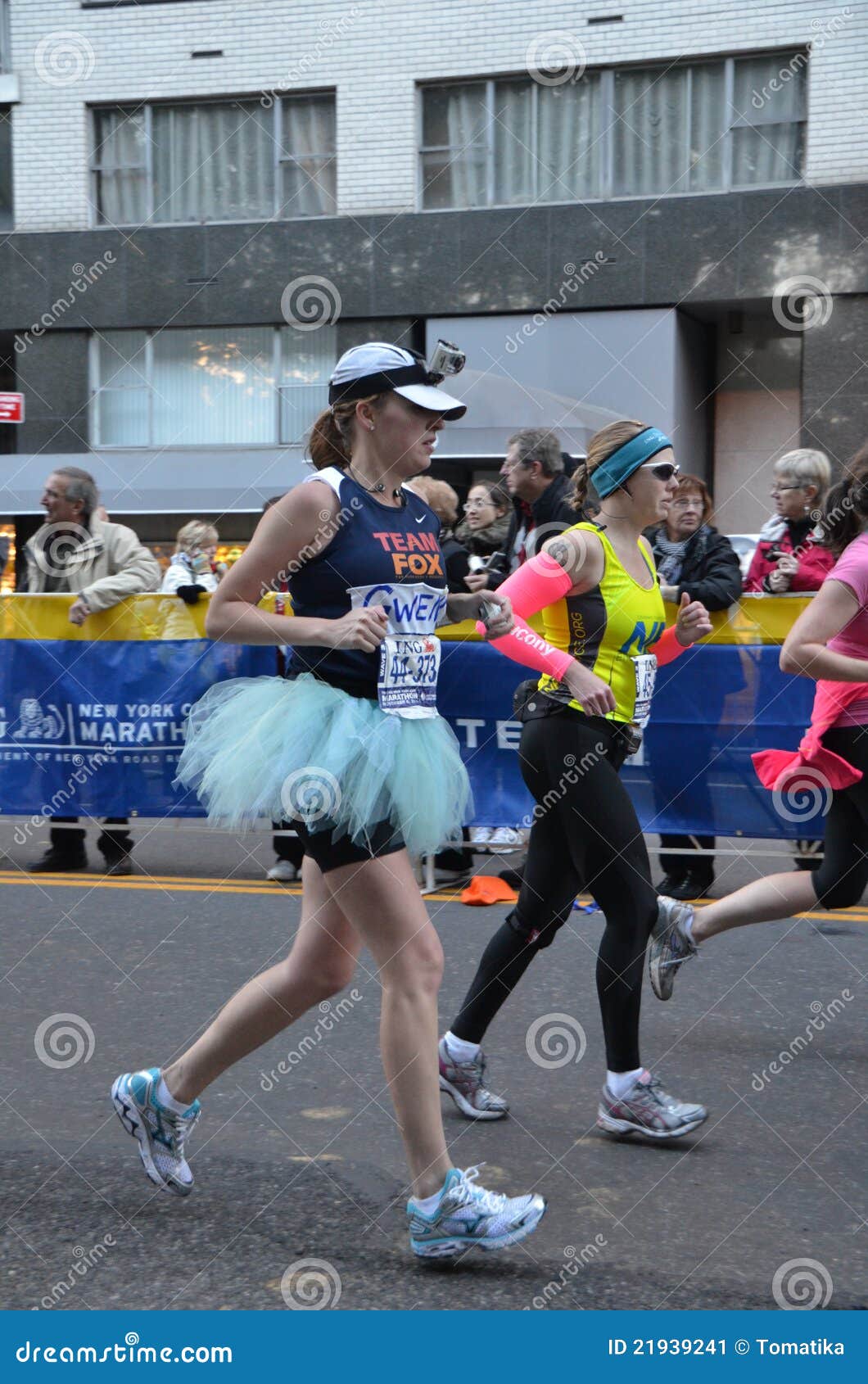 Runner in blue tutu editorial photo. Image of exercise - 21939241