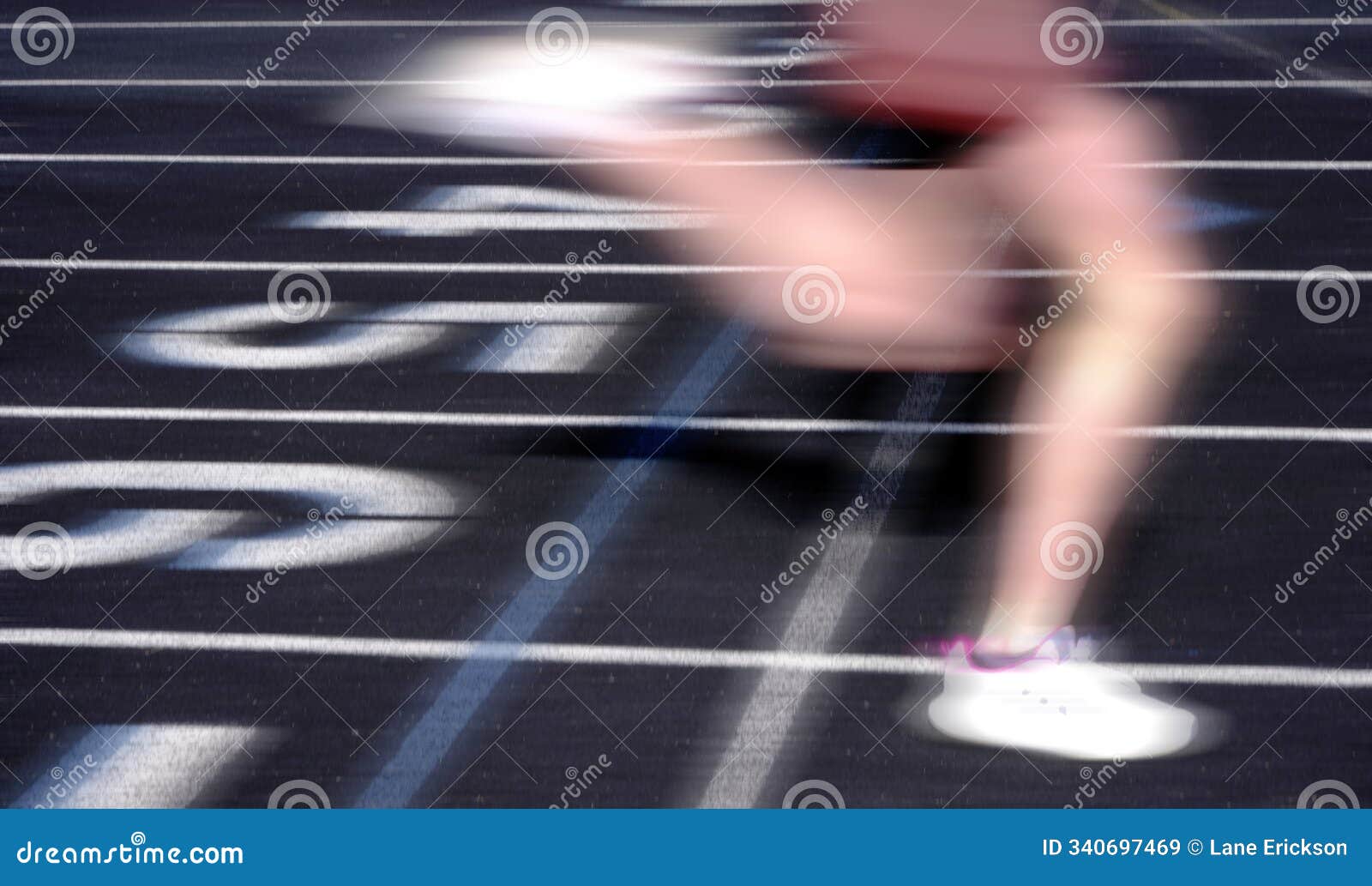 Runner Crossing the Finish Line of a Race on a Track Blurred Stock ...