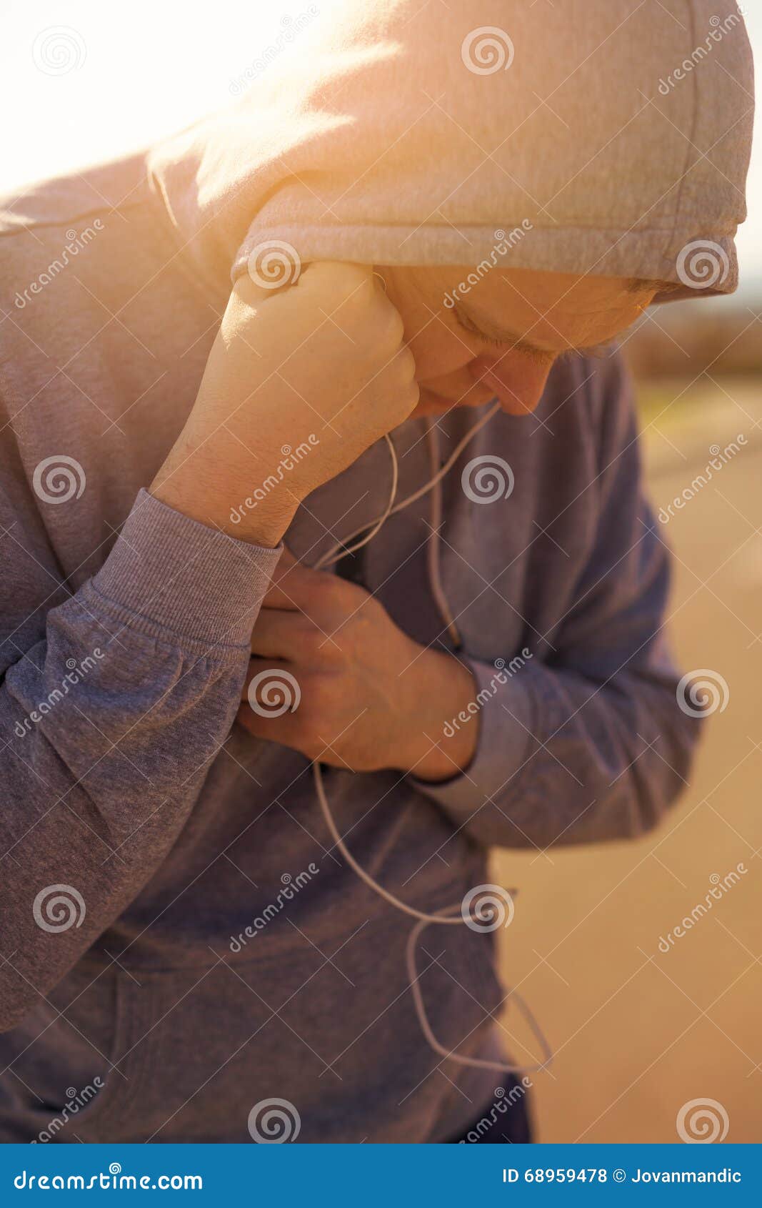 Runner Deep in Thought while Listening To Music Stock Photo - Image of ...