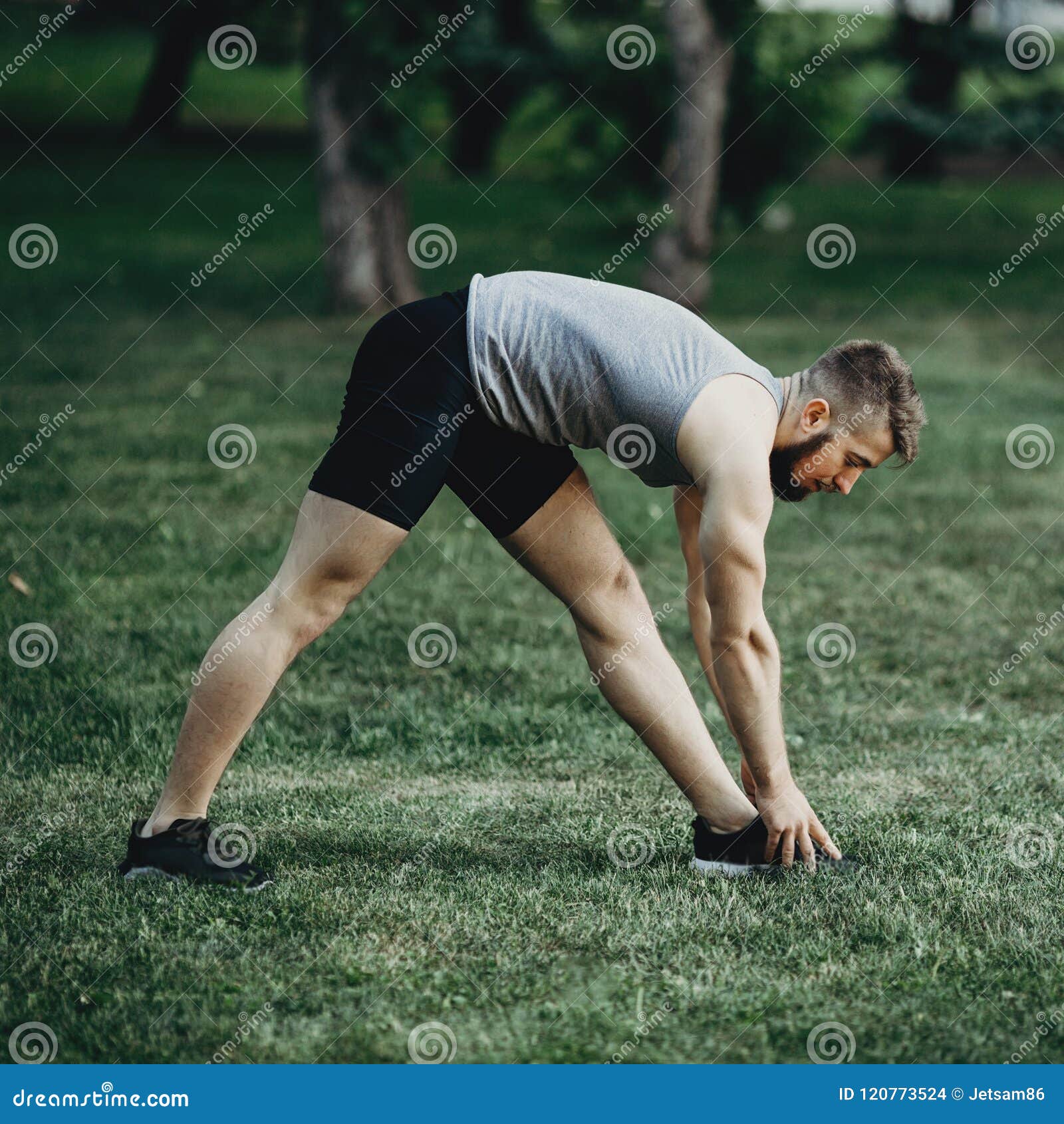 Runner Doing Stretching Exercise before Workout Stock Photo - Image of ...