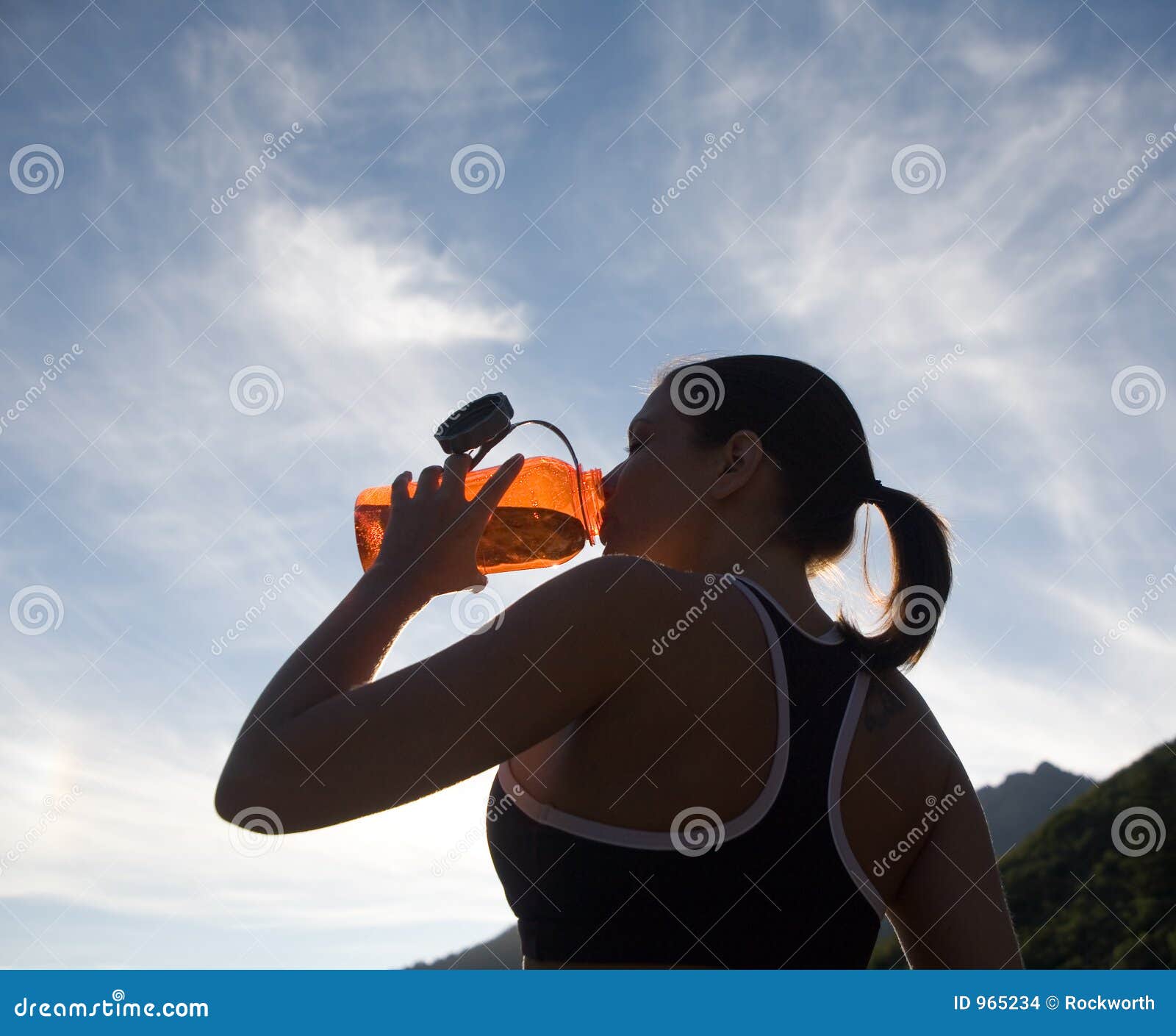 Runner drinking water stock photo. Image of success, clouds - 965234