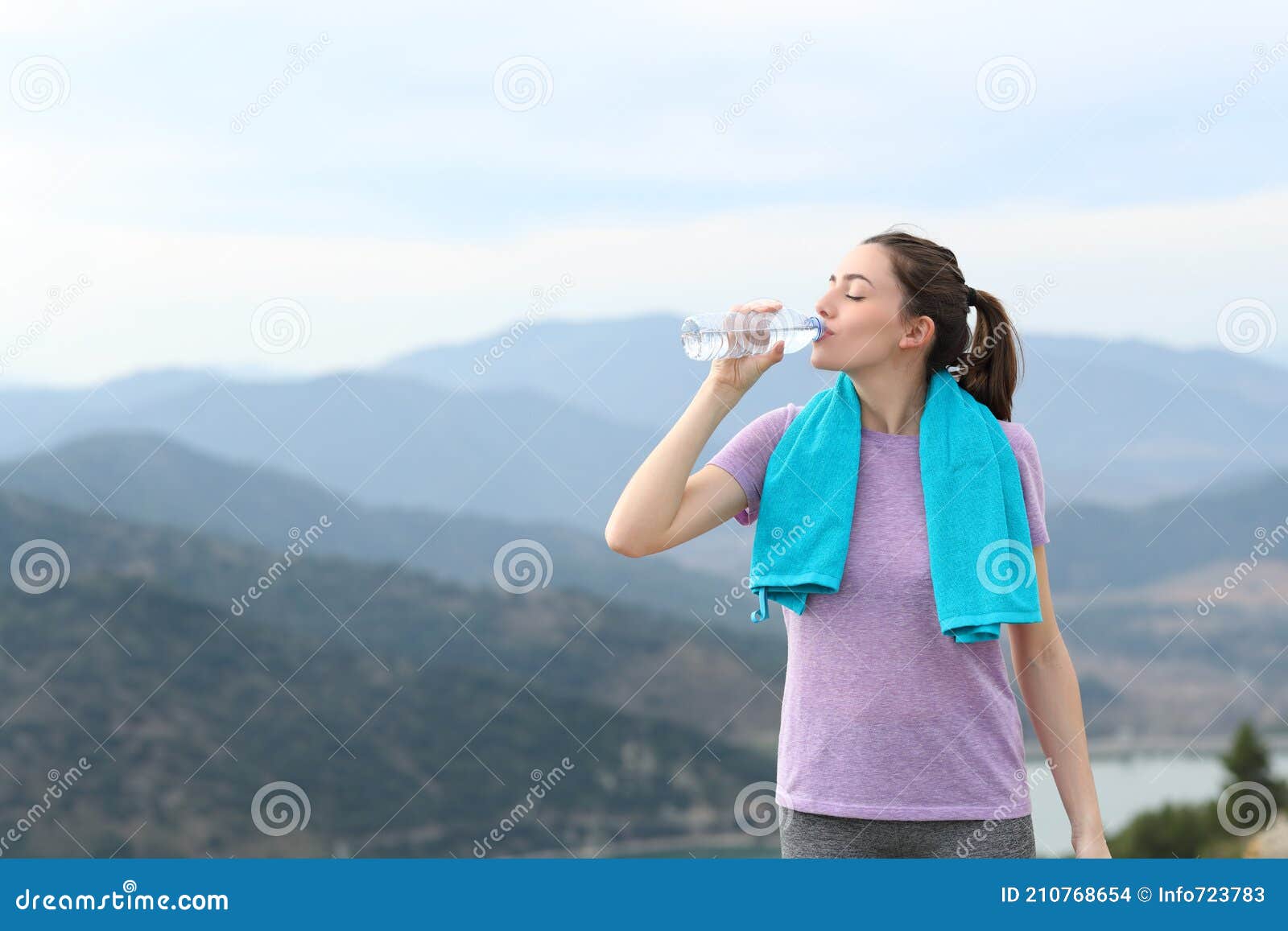Runner Drinking Water after Sport in the Mountain Stock Photo - Image ...
