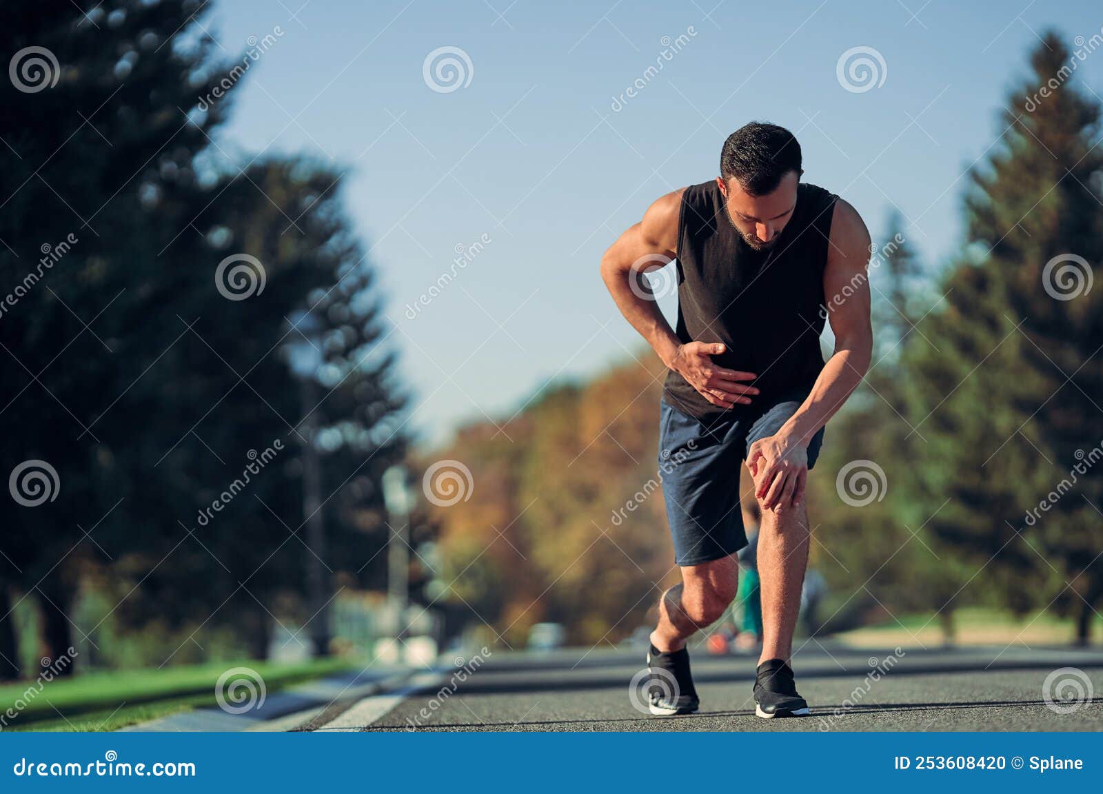 The Runner Feeling Bad while Running. Stock Photo - Image of park ...