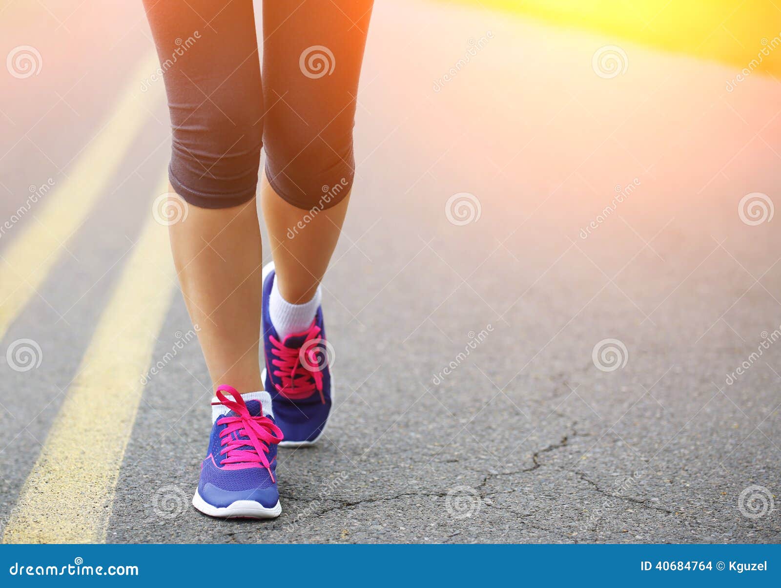 Runner Female Feet Running on Road Stock Photo - Image of flare, copy ...