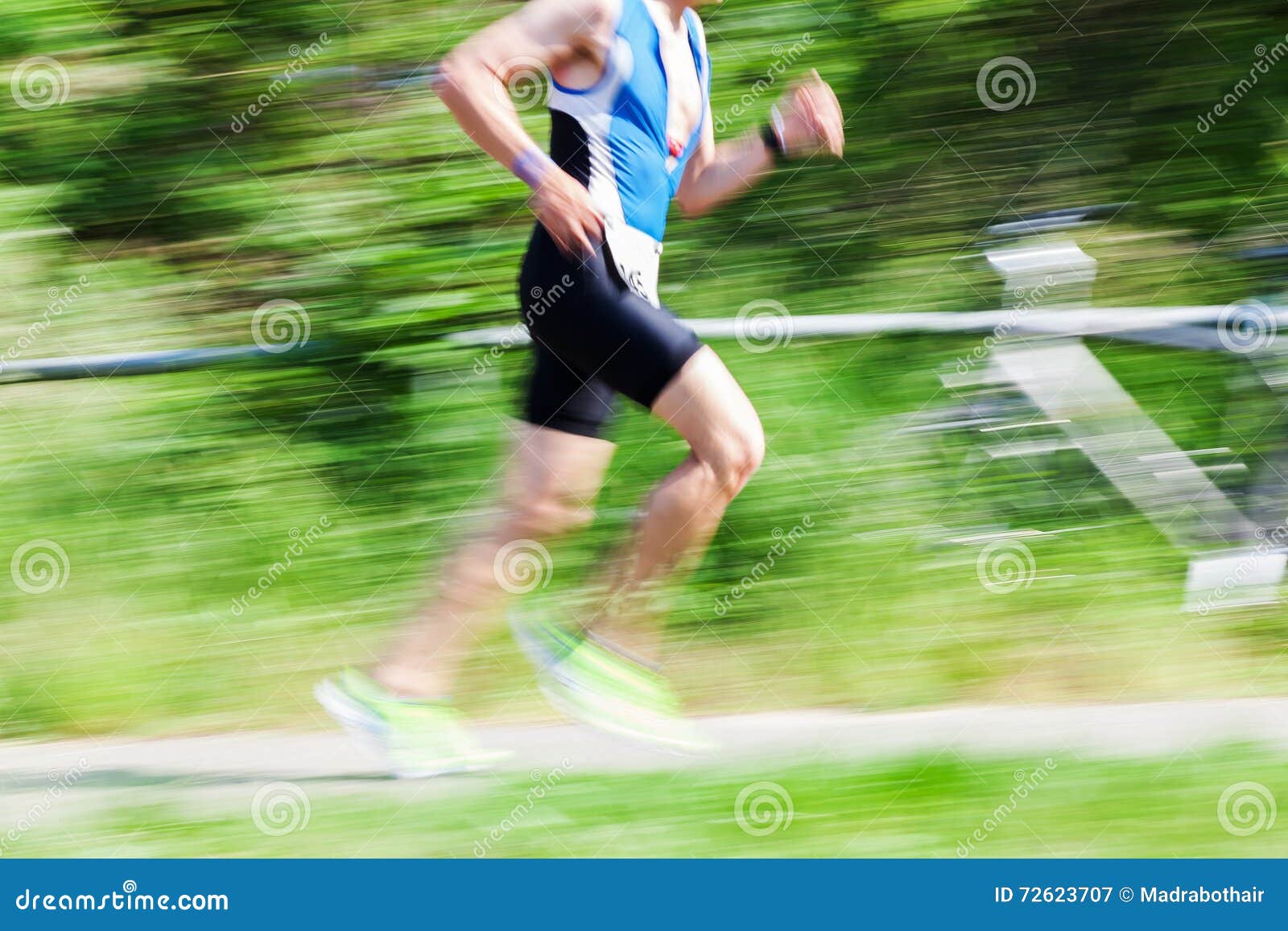 Runner at a foot race stock image. Image of blurry, motion - 72623707