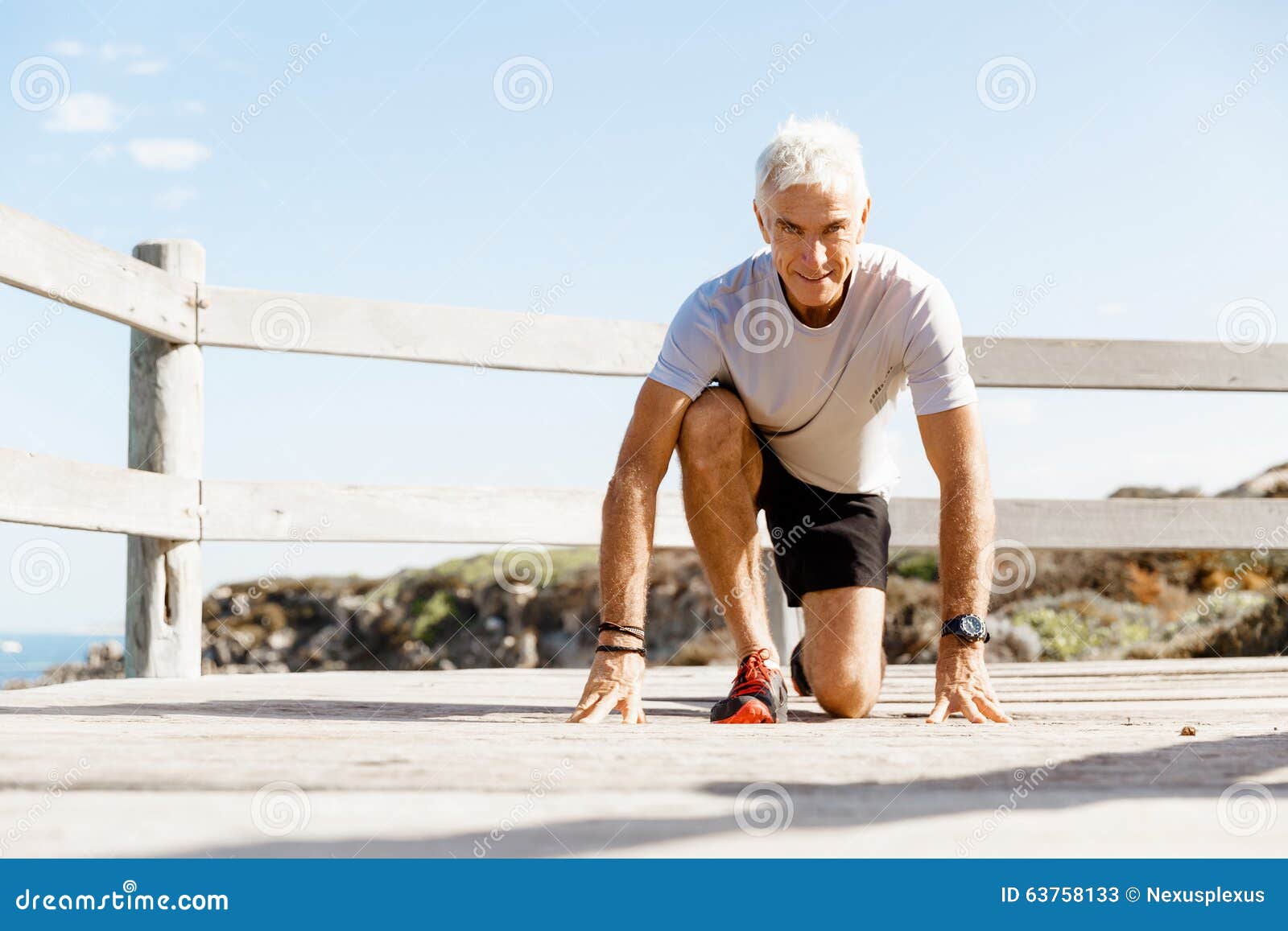 Runner Getting Ready To Start the Race Stock Image - Image of focus ...
