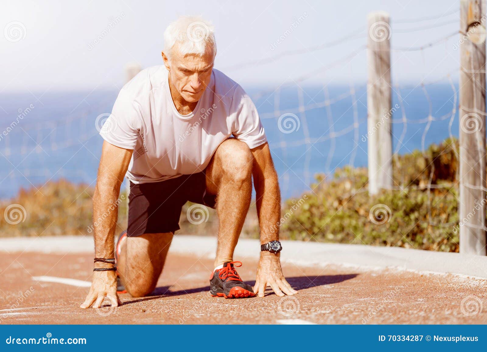 Runner Getting Ready To Start the Race Stock Image - Image of lane ...