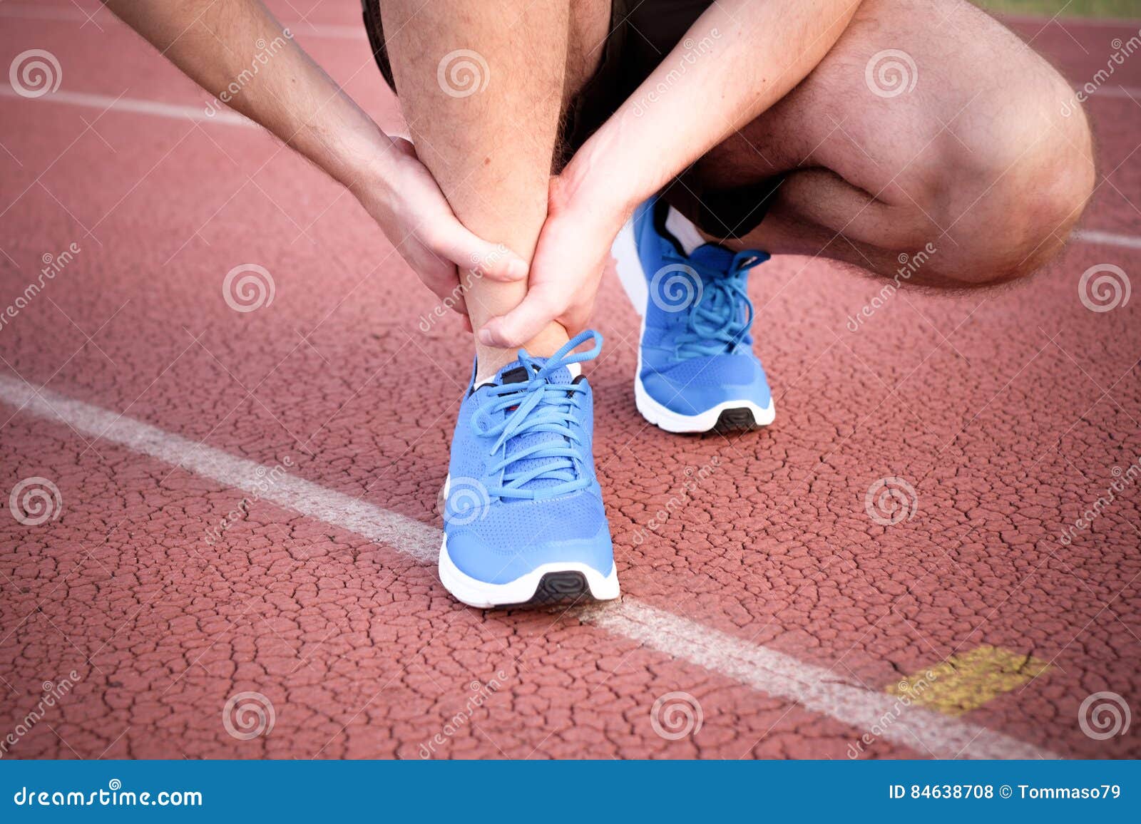 Runner with Injured Knee on the Track Stock Photo - Image of broken ...