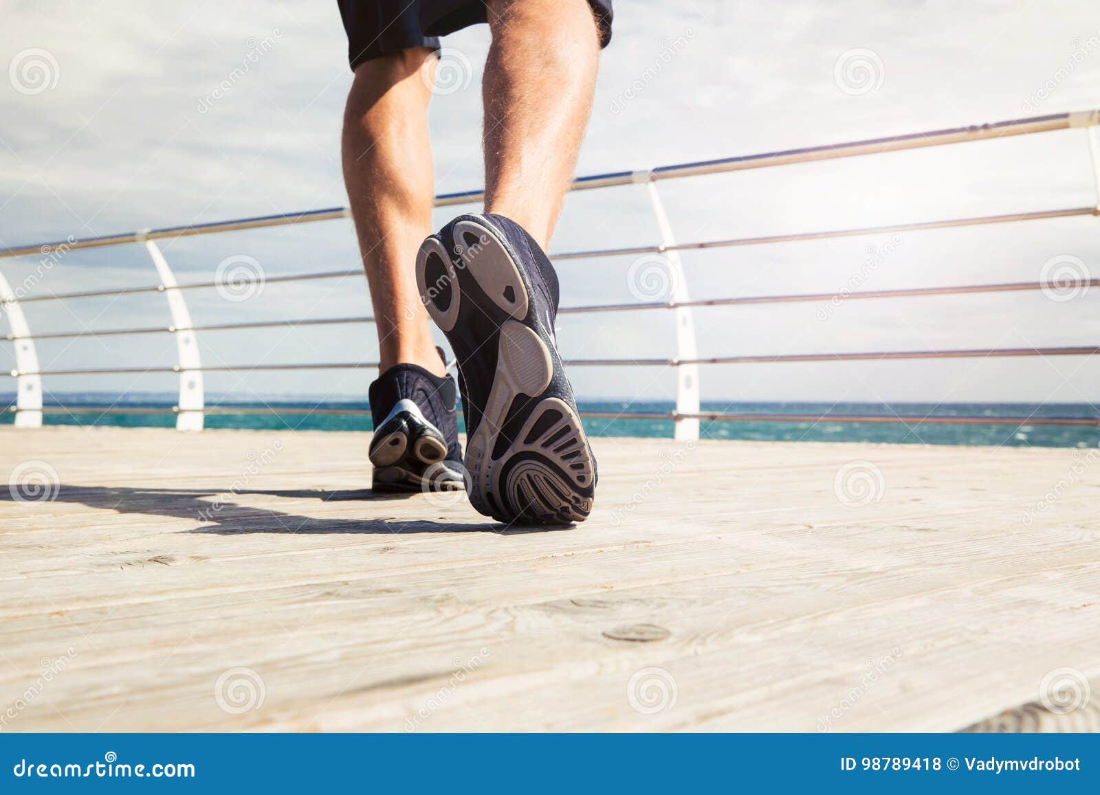 Runner male legs stock photo. Image of track, active - 98789418