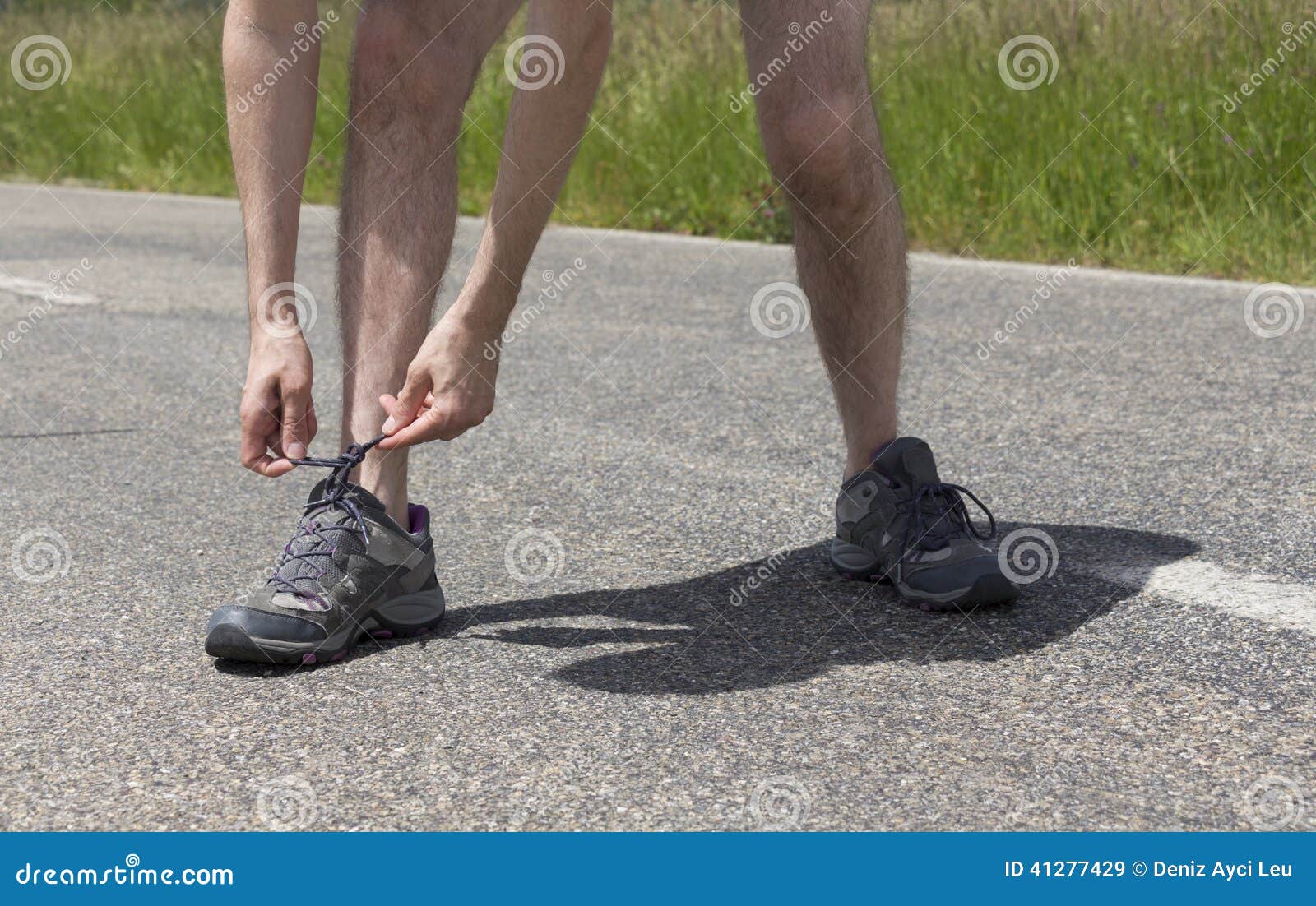 Runner Man Binding the Shoe Laces Stock Image - Image of string, road ...