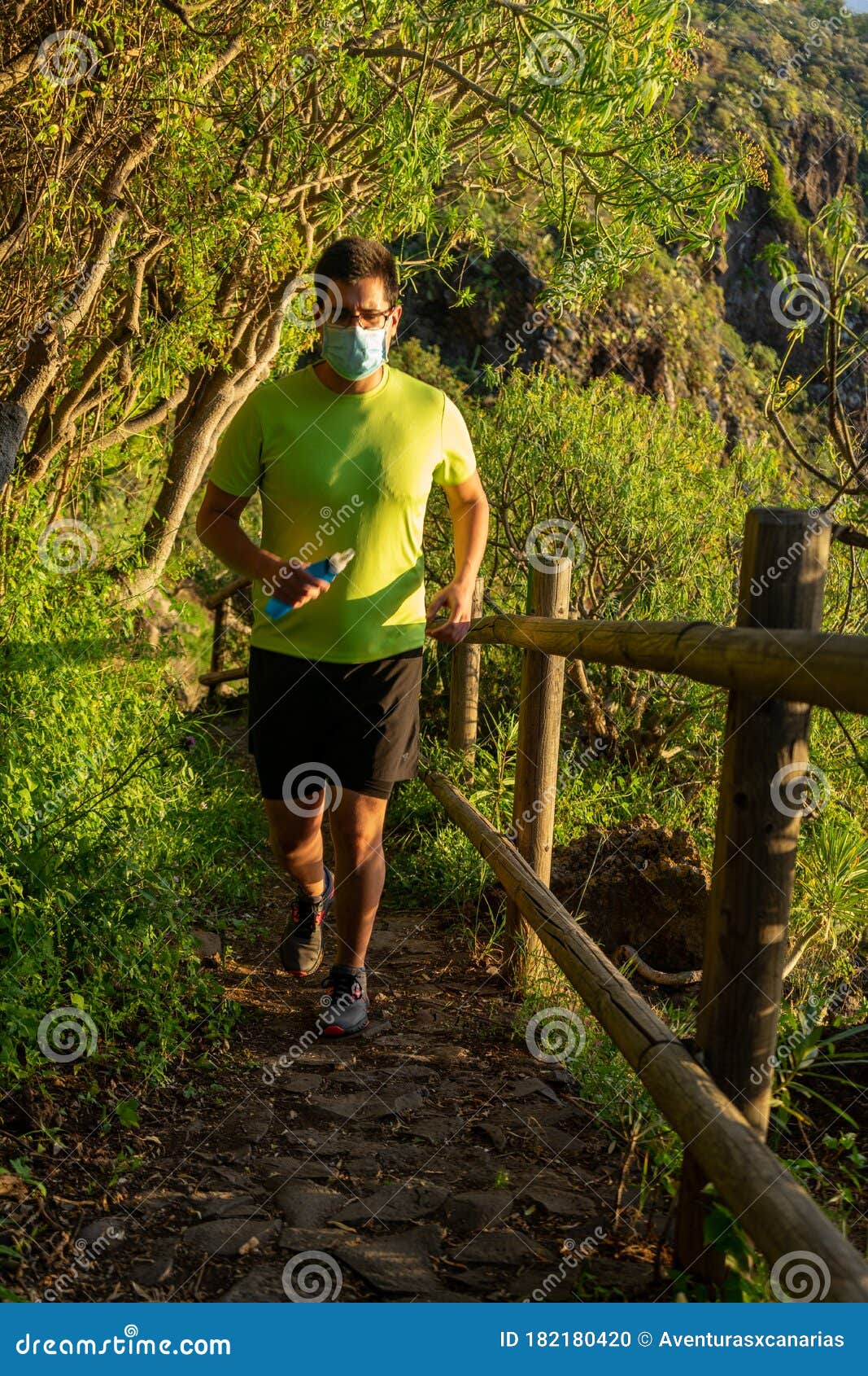 Runner Practices Trail Running in a Forest. Stock Photo - Image of ...