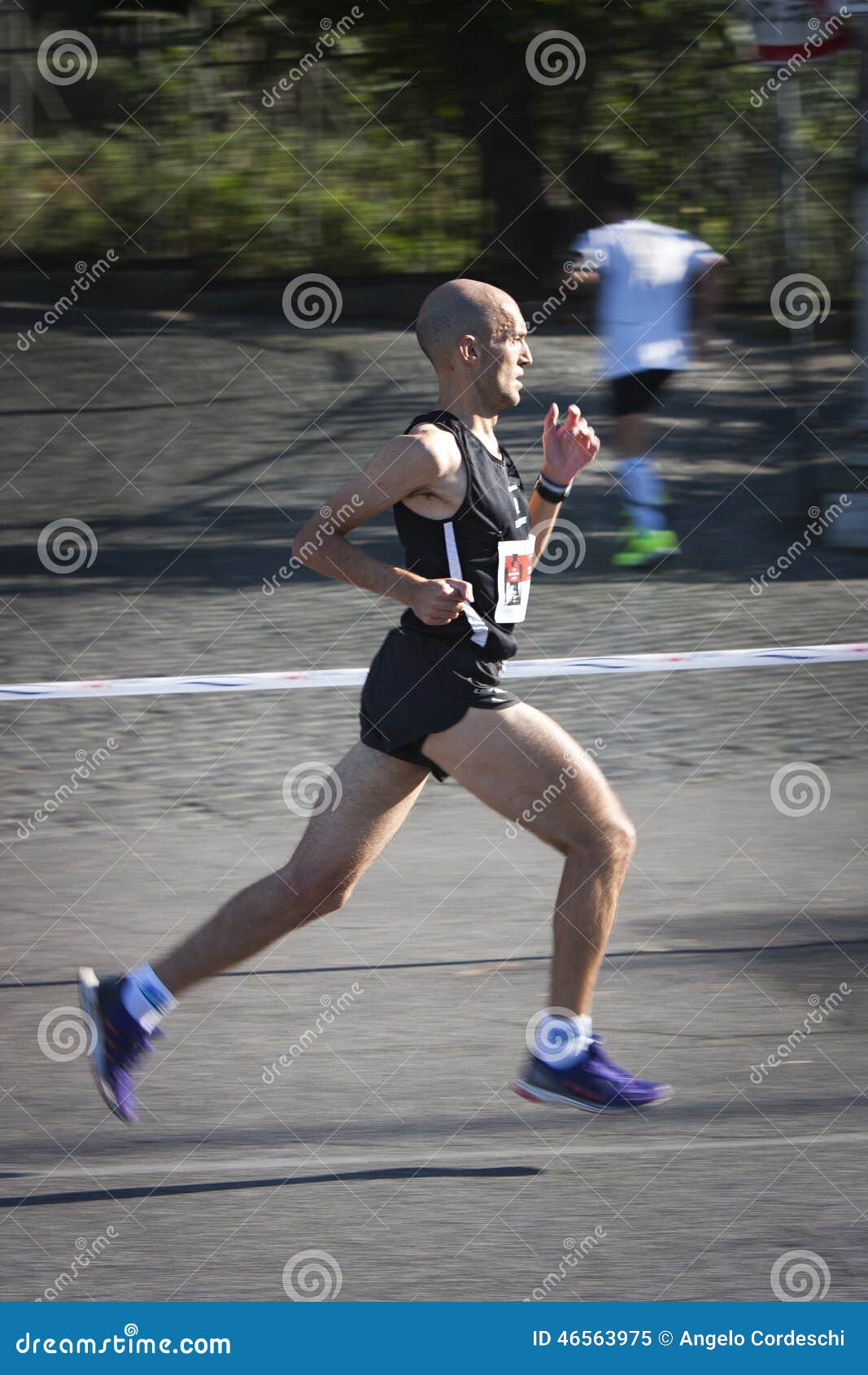 A Runner in Profile. Motion Blur To Emphasize the Speed Editorial Image ...
