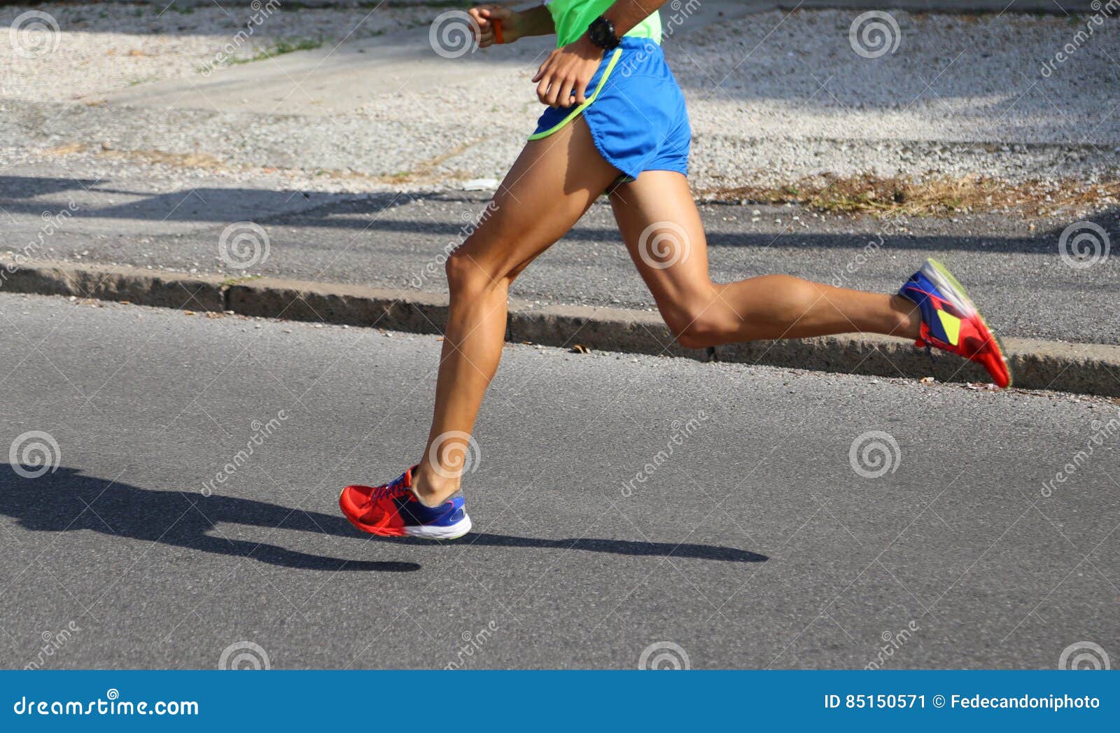 Runner during a Running Race on Paved Roads in the City Stock Image ...
