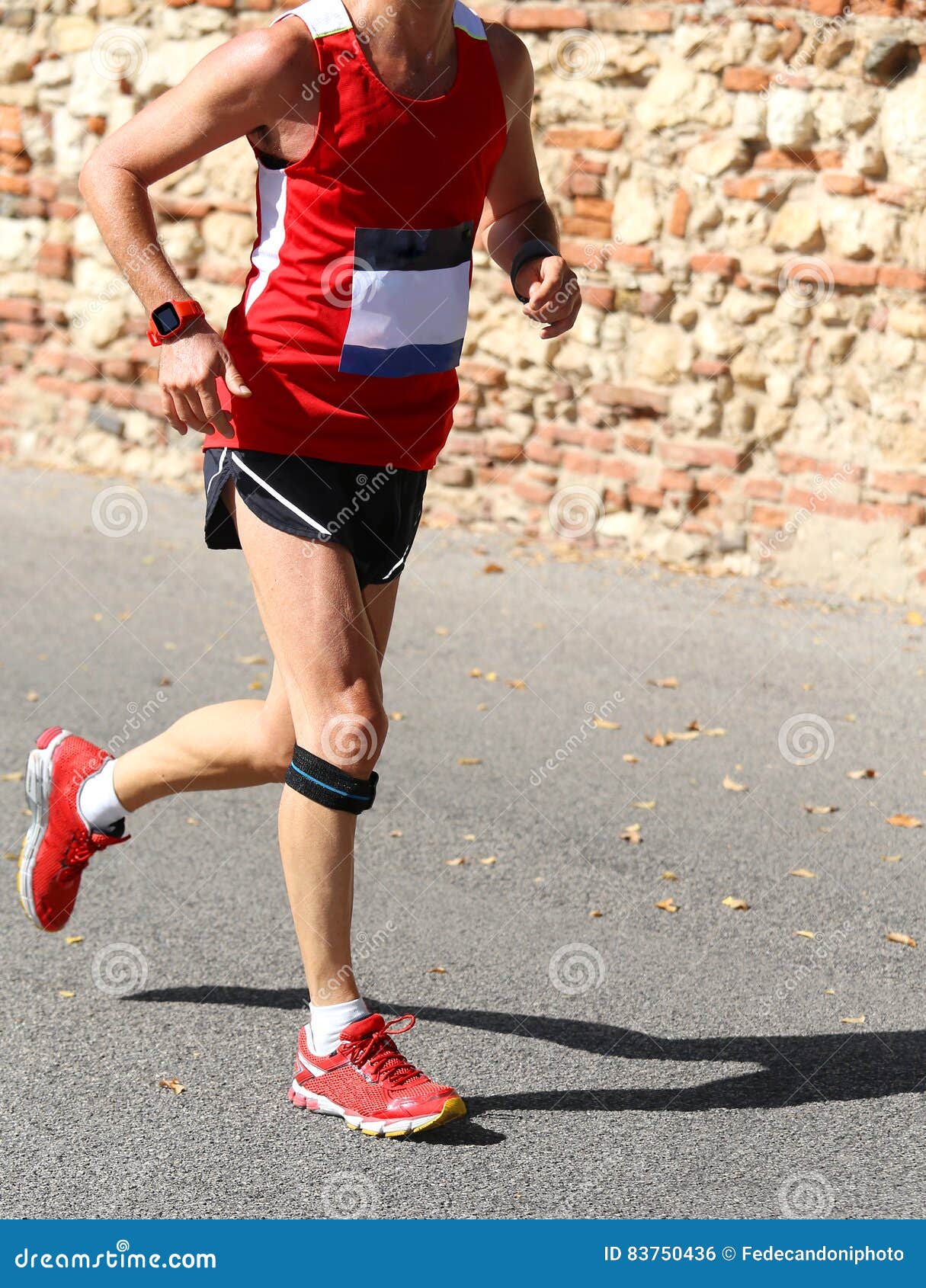 Runner Runs with a Band Below the Knee Stock Photo - Image of legs ...