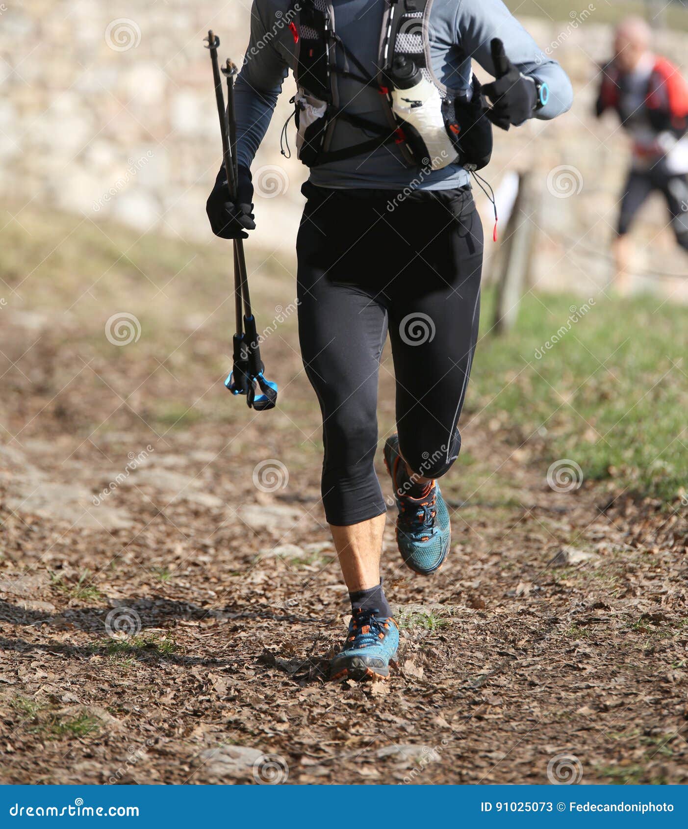 Runner Runs in the Mountains with Nordic Walking Sticks Stock Image ...