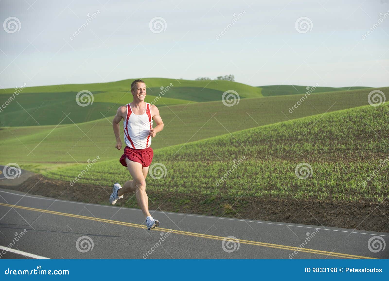 Runner on Rural Road stock photo. Image of jogger, remote - 9833198