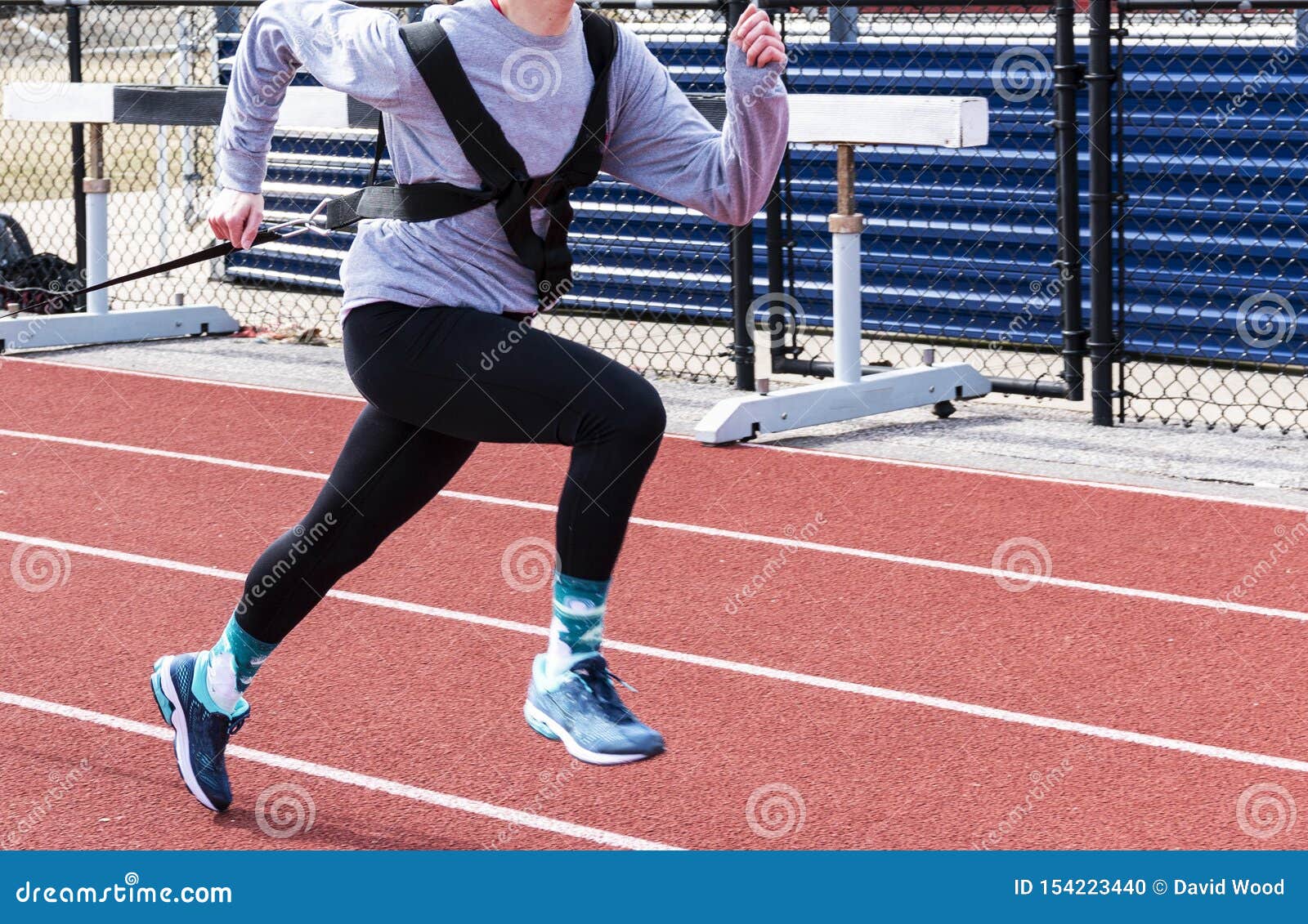 Runner Sprinting while Pulling a Sled with Weights Stock Photo - Image ...