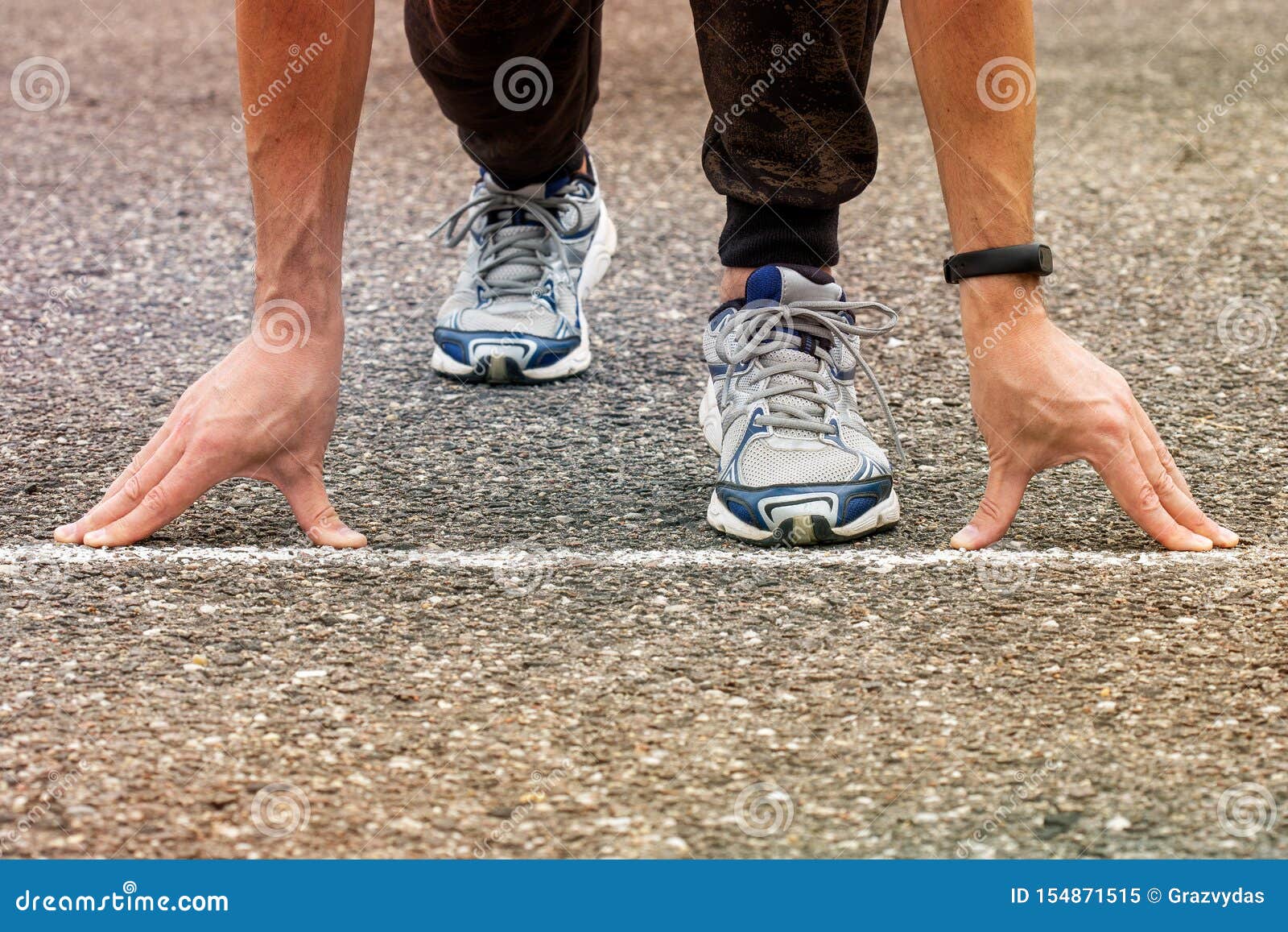 Runner in a Stadium is in Start Position Stock Image - Image of ...