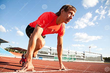 Runner at the start stock image. Image of muscular, running - 20635695