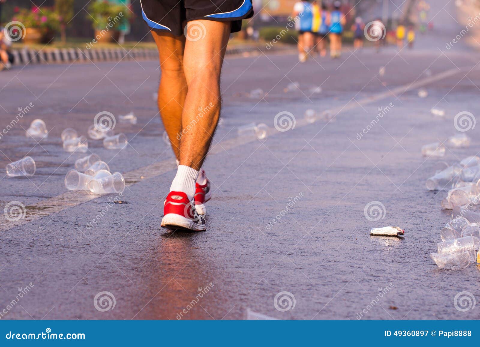 Runner Take a Water in a Marathon Race Editorial Photography - Image of ...