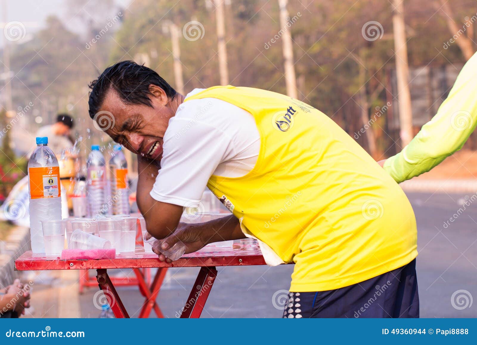 Runner Take a Water in a Marathon Race Editorial Stock Image - Image of ...