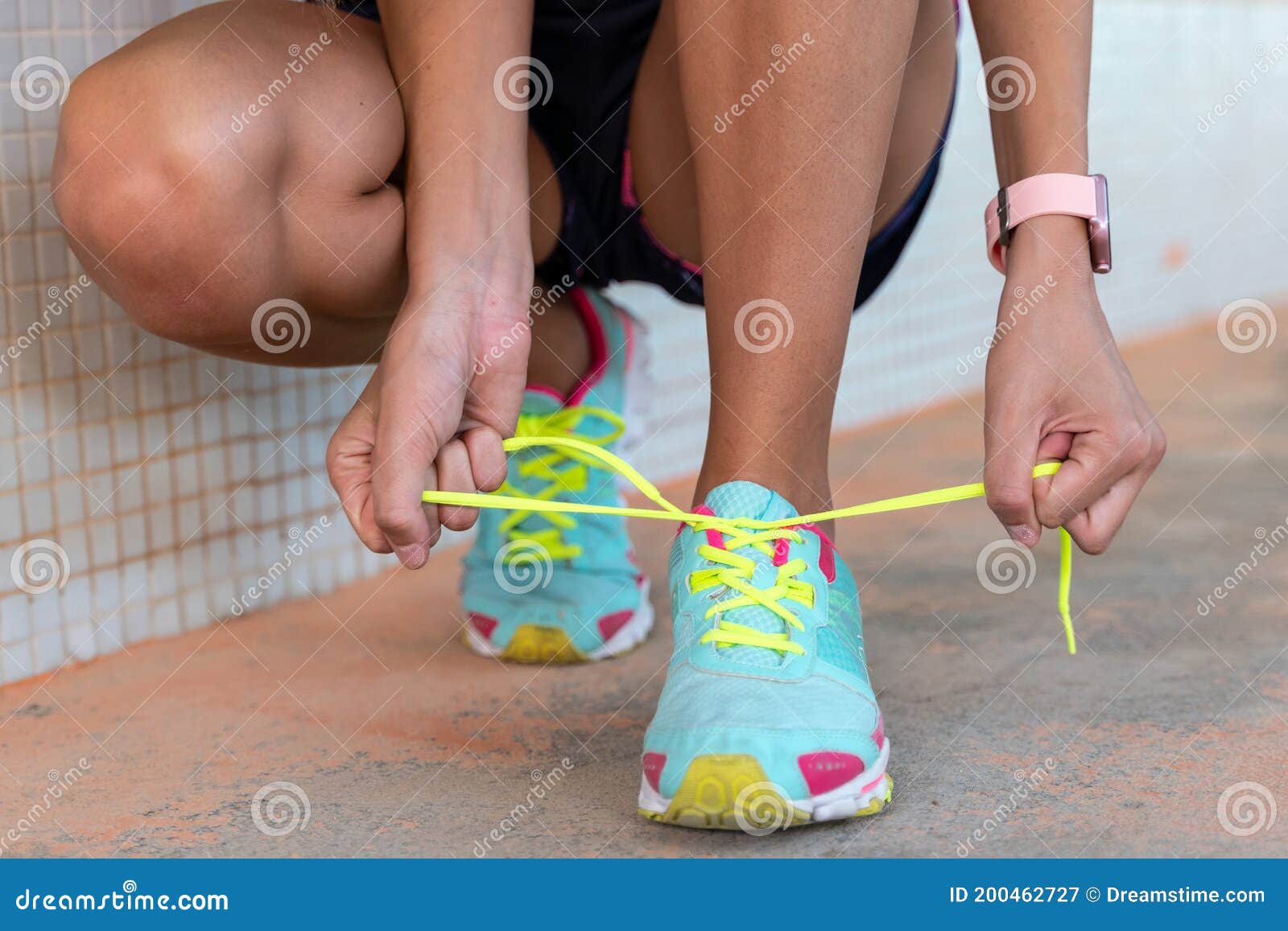 Runner Tying Her Shoes before Going for a Run Stock Image - Image of ...