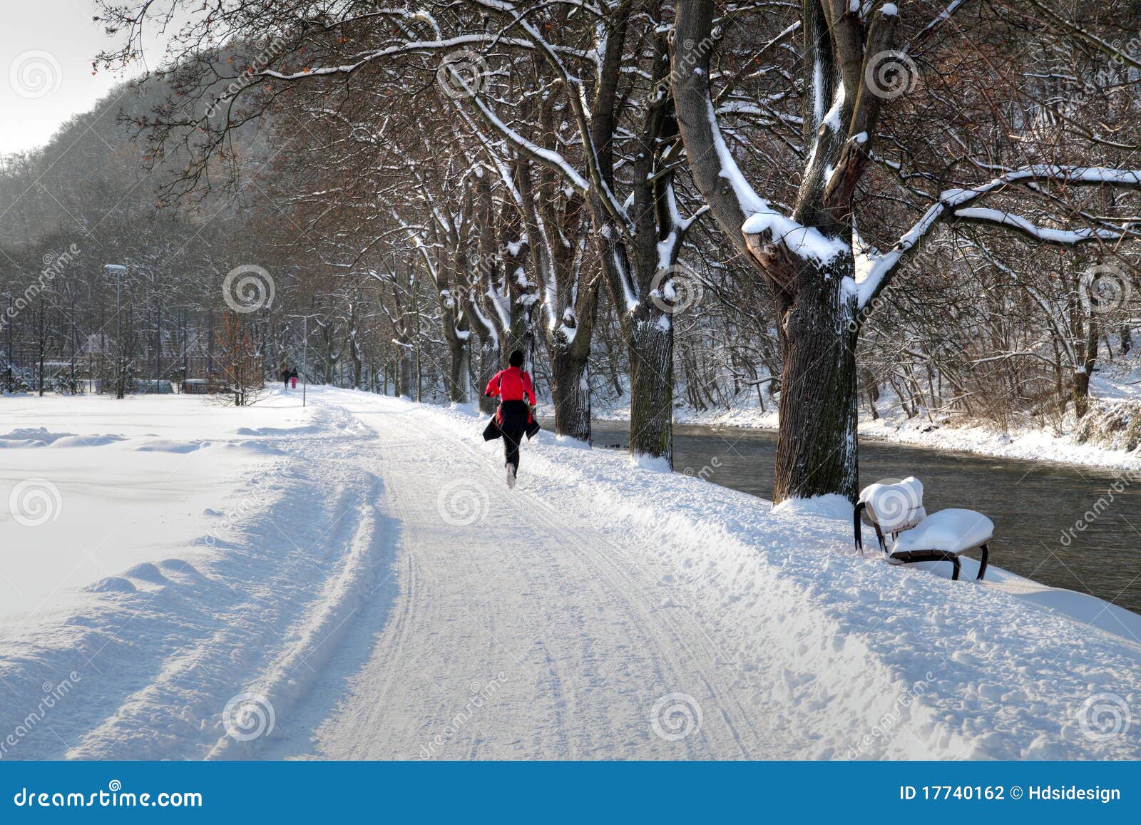 Runner on winter road stock photo. Image of outdoors - 17740162