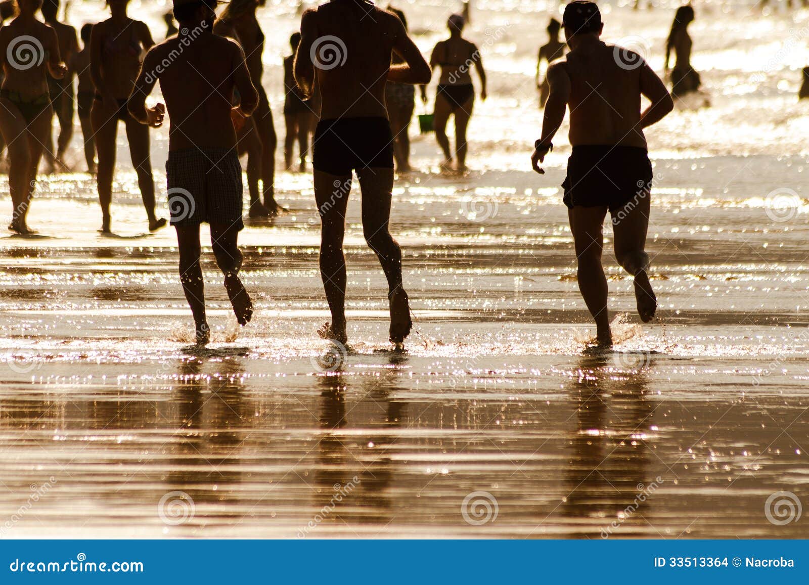 Runners in the beach stock photo. Image of happy, travel - 33513364