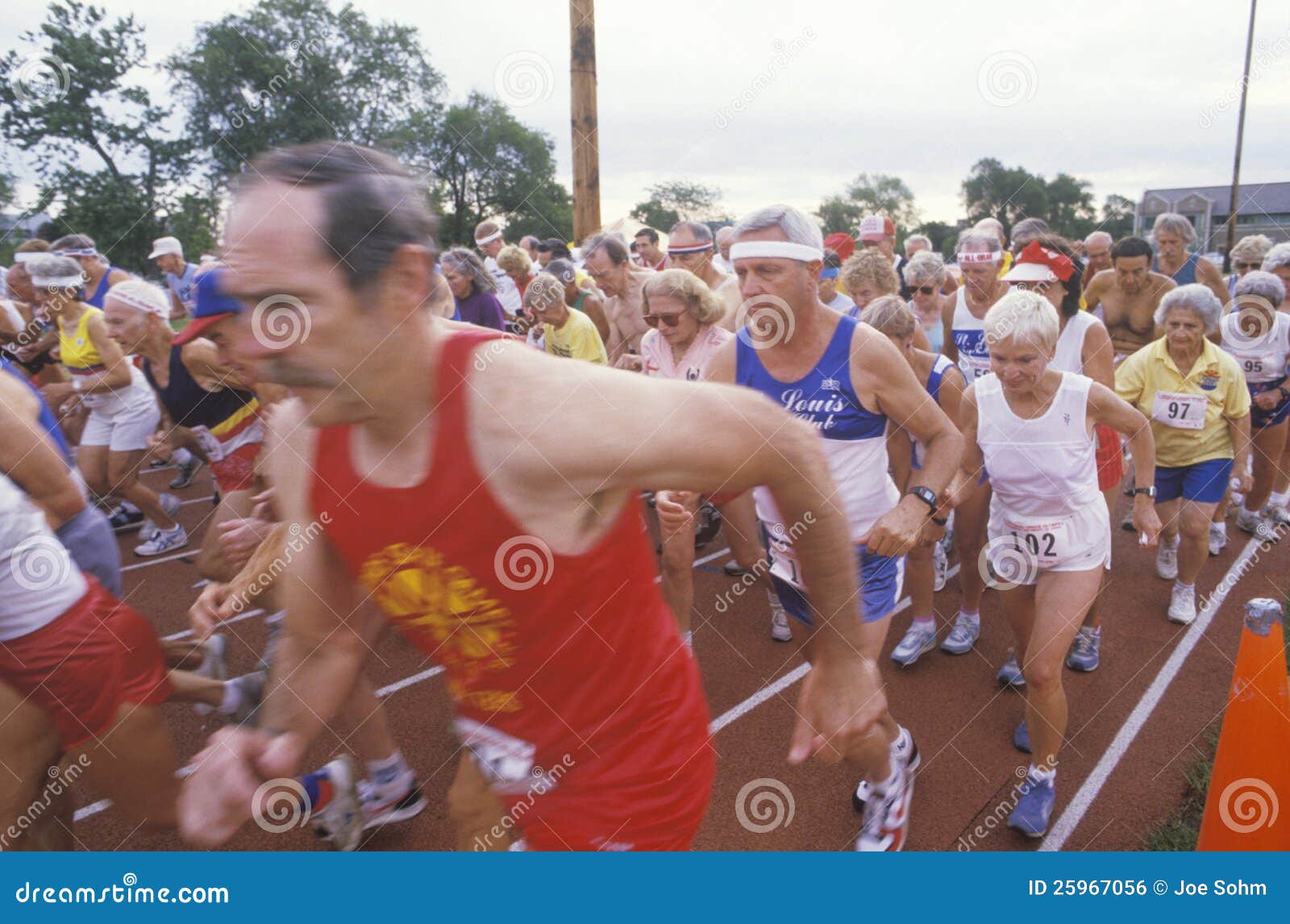 Runners Crossing the Starting Line Editorial Photo - Image of color ...