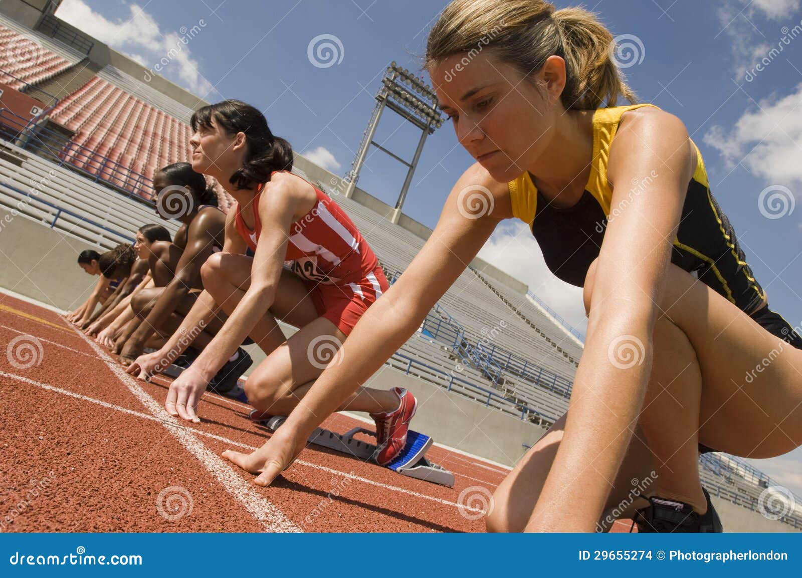 Runners Getting Ready To Start the Race Stock Photo - Image of group ... Runners Getting Ready To Start the Race Stock Photo - Image of group ...