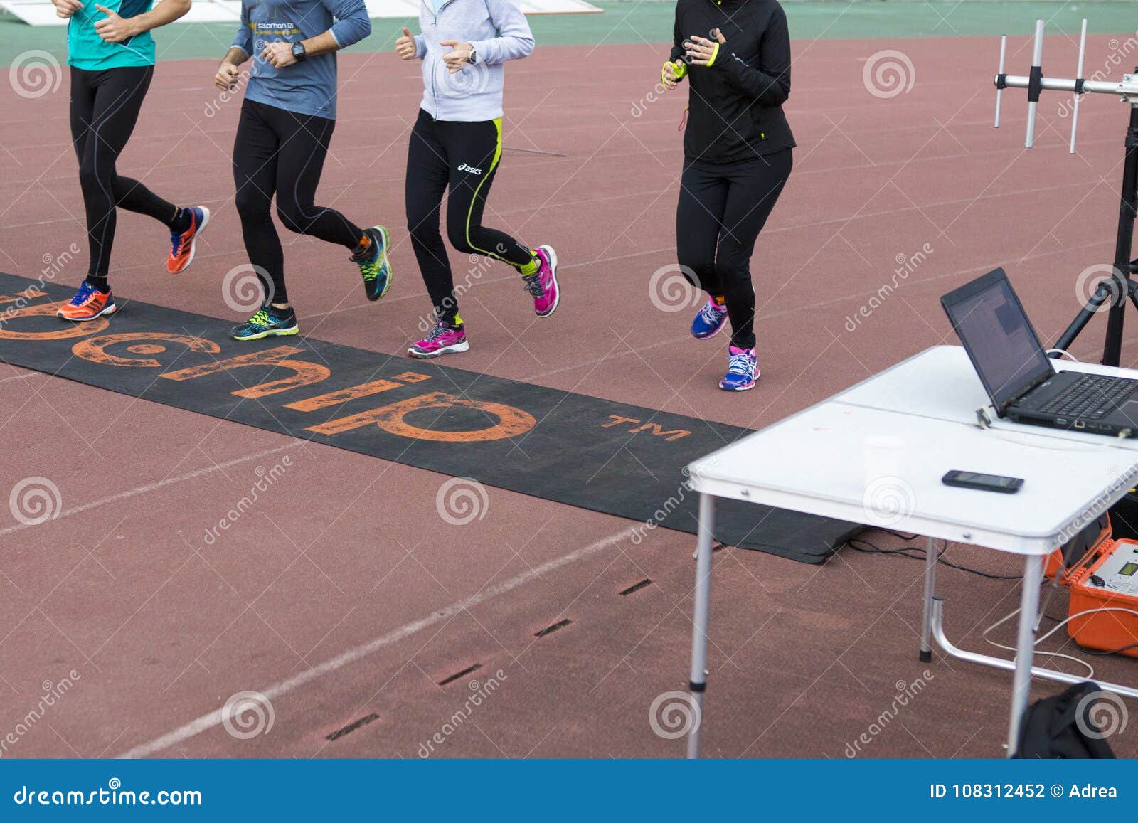 Runners Passing a Timekeeping Checkpoint Editorial Photography - Image ...