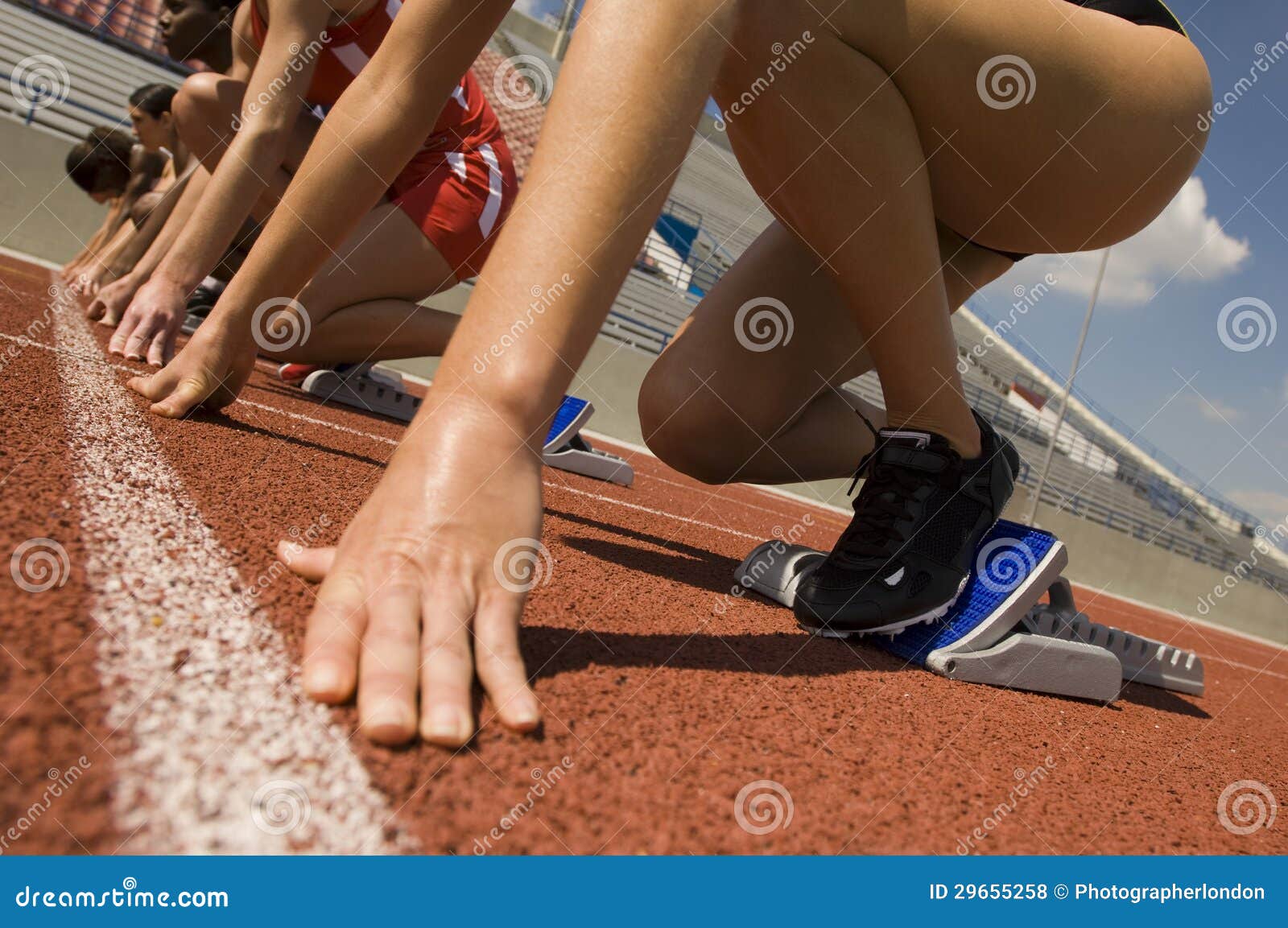 Runners Preparing for Race stock photo. Image of middle - 29655258