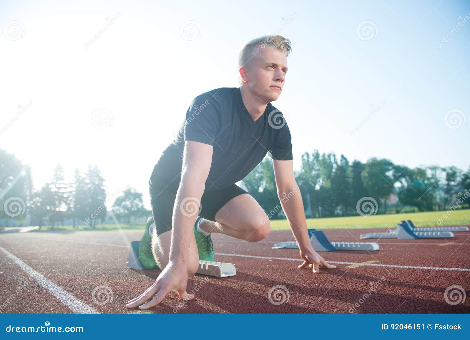 Runners Preparing for Race at Starting Blocks Stock Image - Image of ...