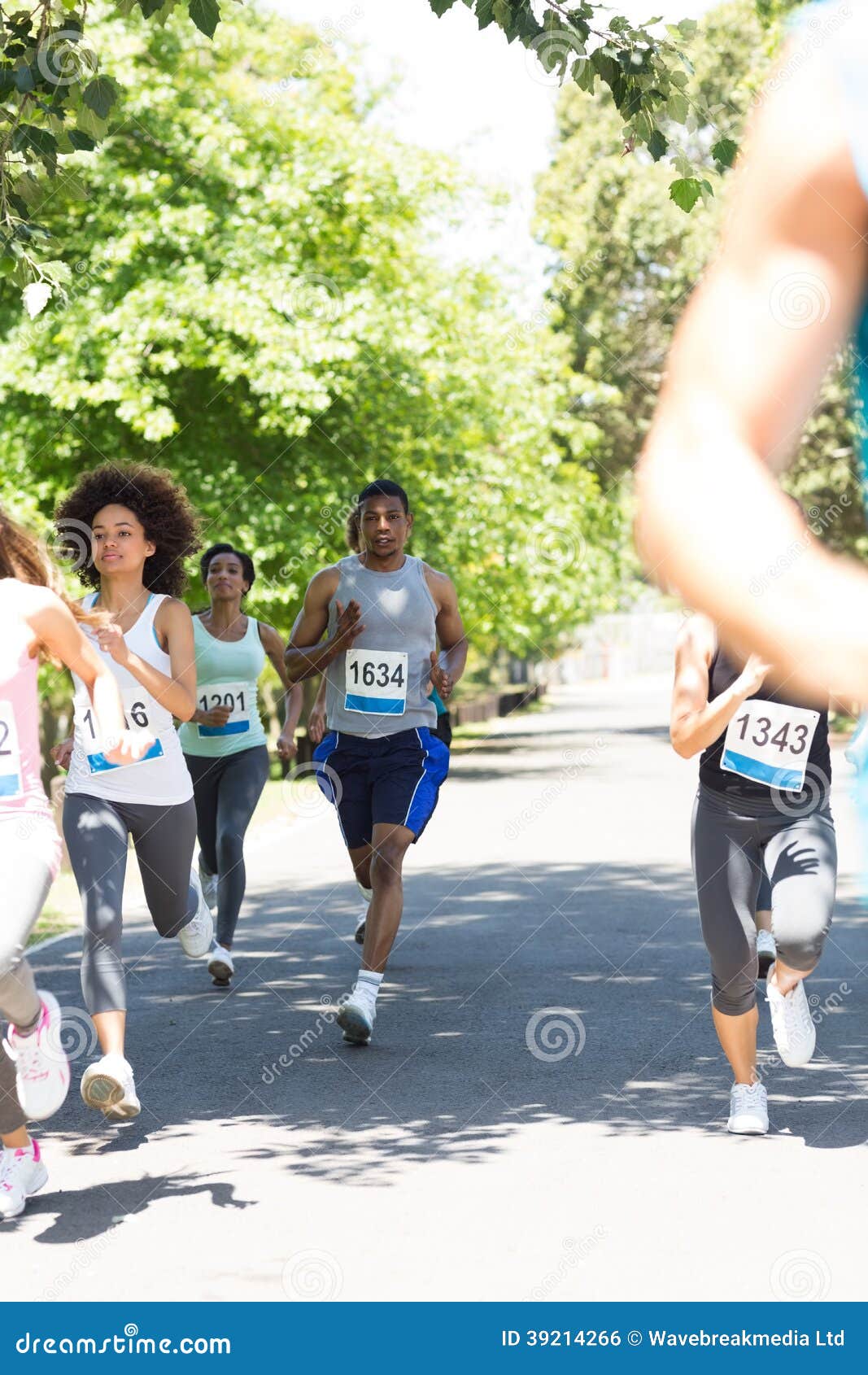 Runners racing in marathon stock photo. Image of wellbeing - 39214266
