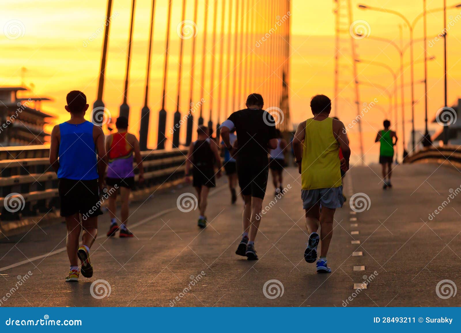 Runners Run on Bridge in the Morning Editorial Photo - Image of bridge ...