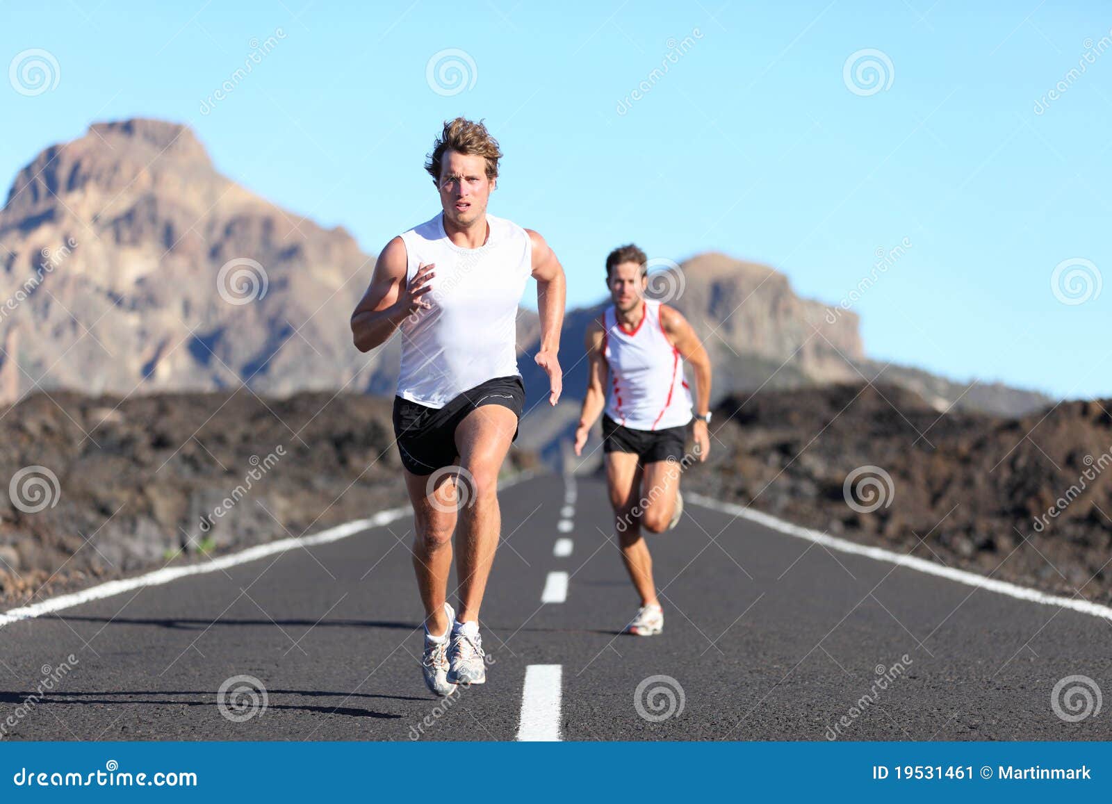 Runners running on road stock image. Image of outside - 19531461