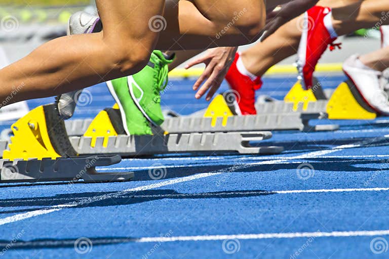 Runners start block stock image. Image of feminine, racetrack - 25626717