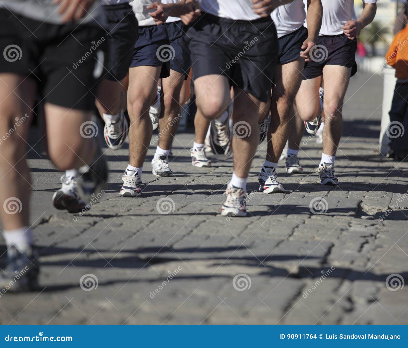 Runners on the Street stock photo. Image of endurance - 90911764