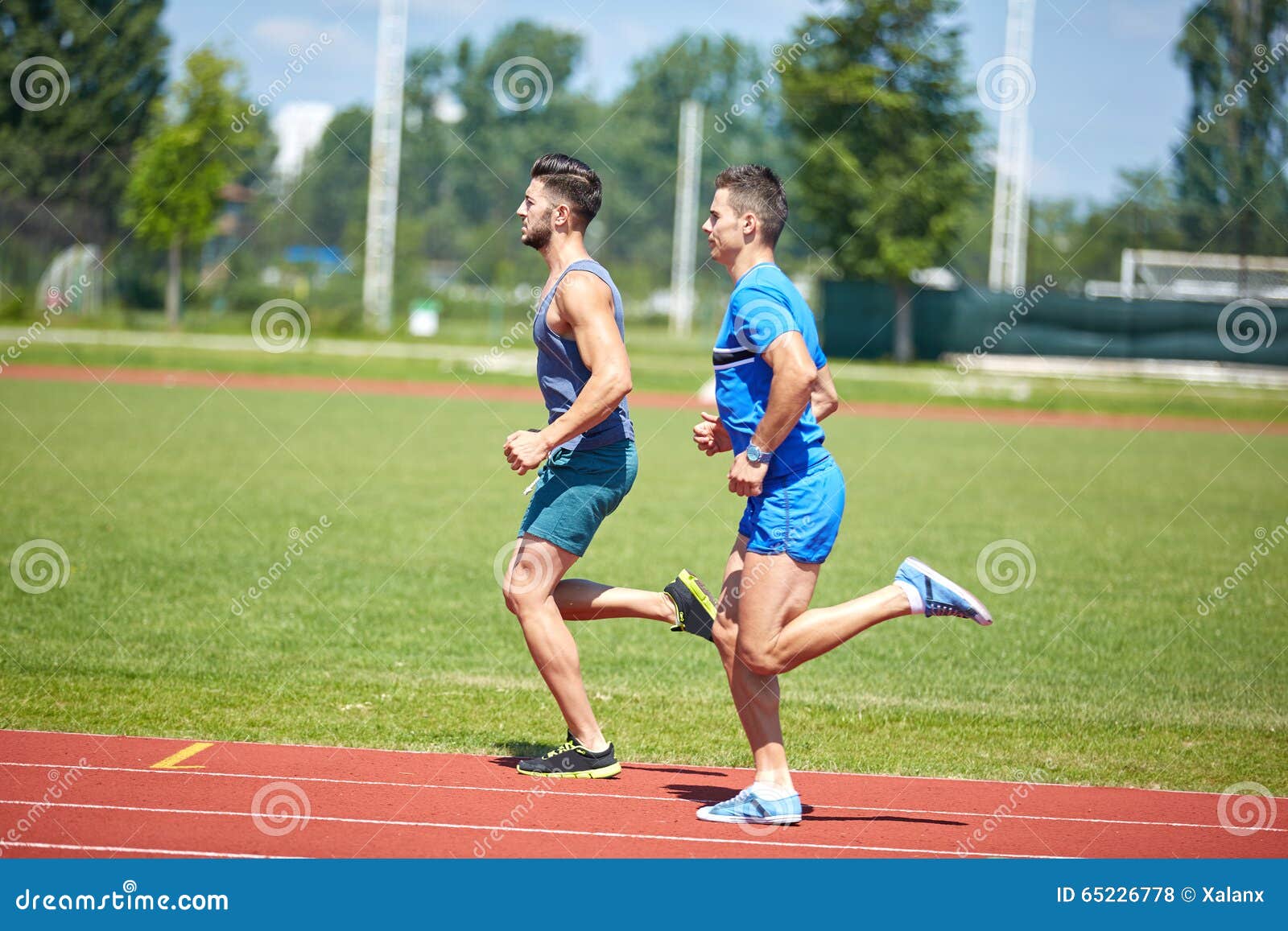 Runners on track stock photo. Image of outdoors, people - 65226778