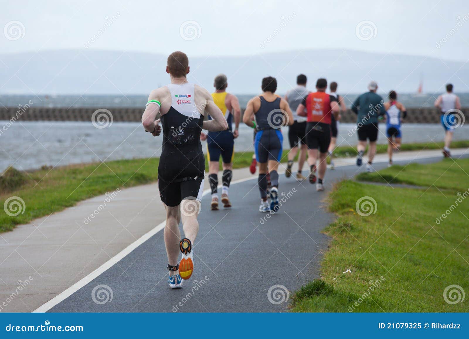 Runners, triathlon editorial image. Image of road, legs - 21079325