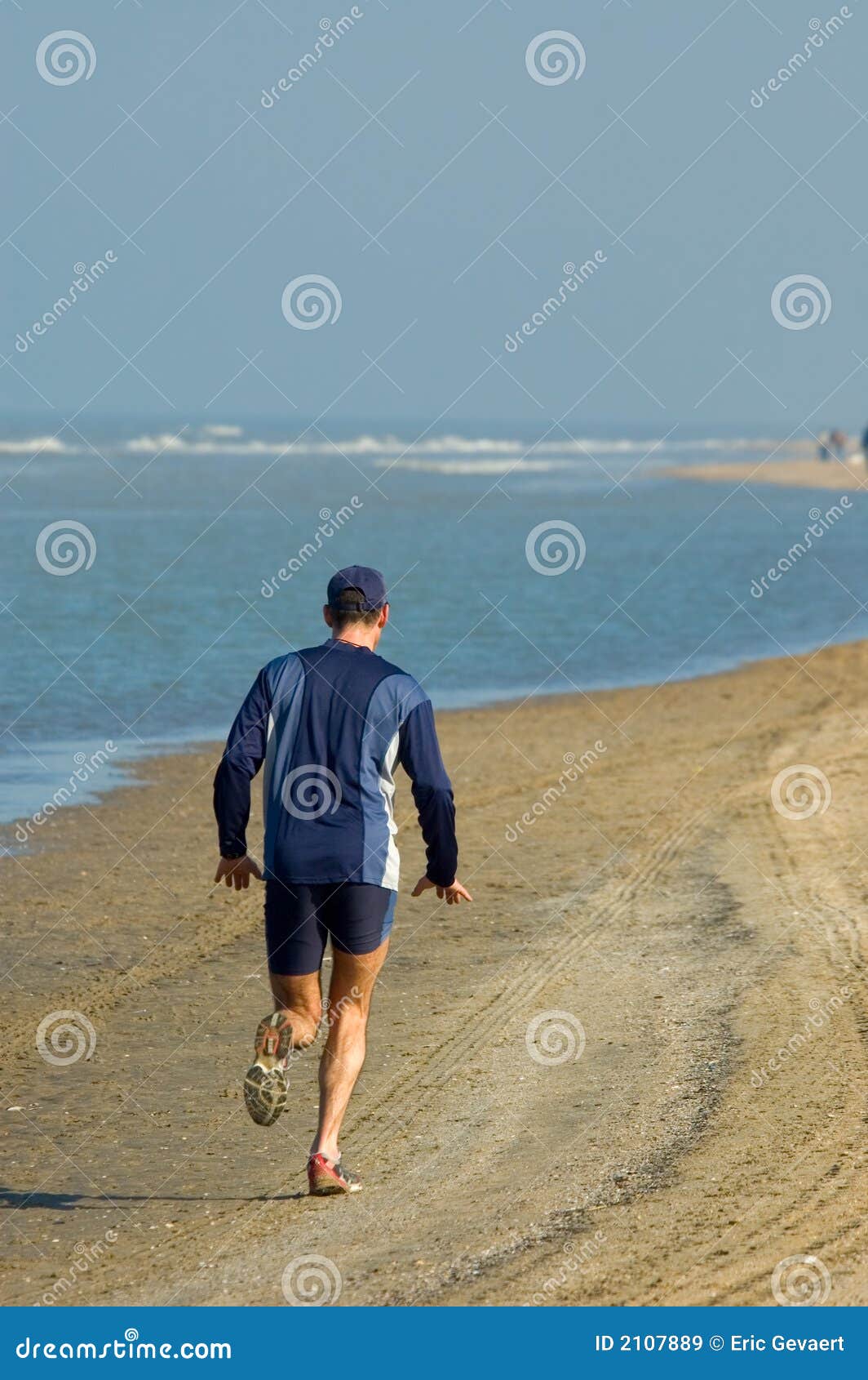 Running along the beach stock image. Image of runner, ocean - 2107889