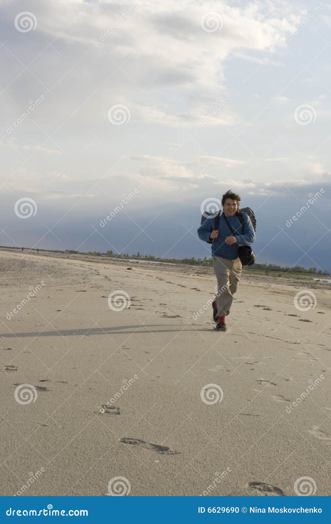 Running along the beach stock photo. Image of exercise - 6629690