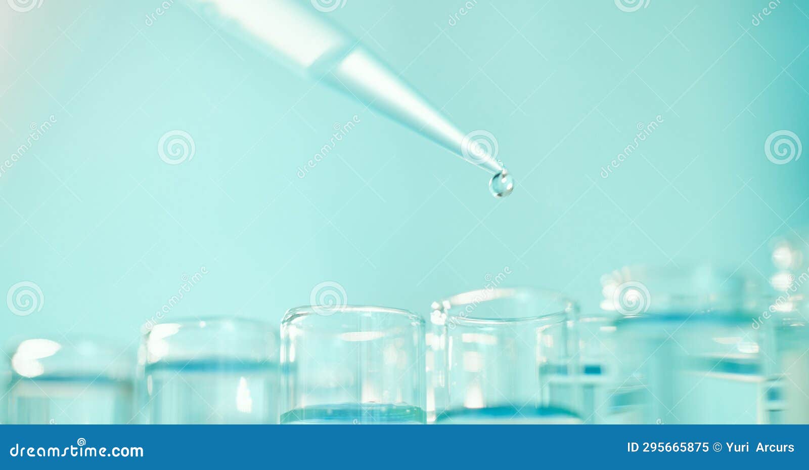 Running As Many Tests As Possible. a Dropper and Beakers in a ...