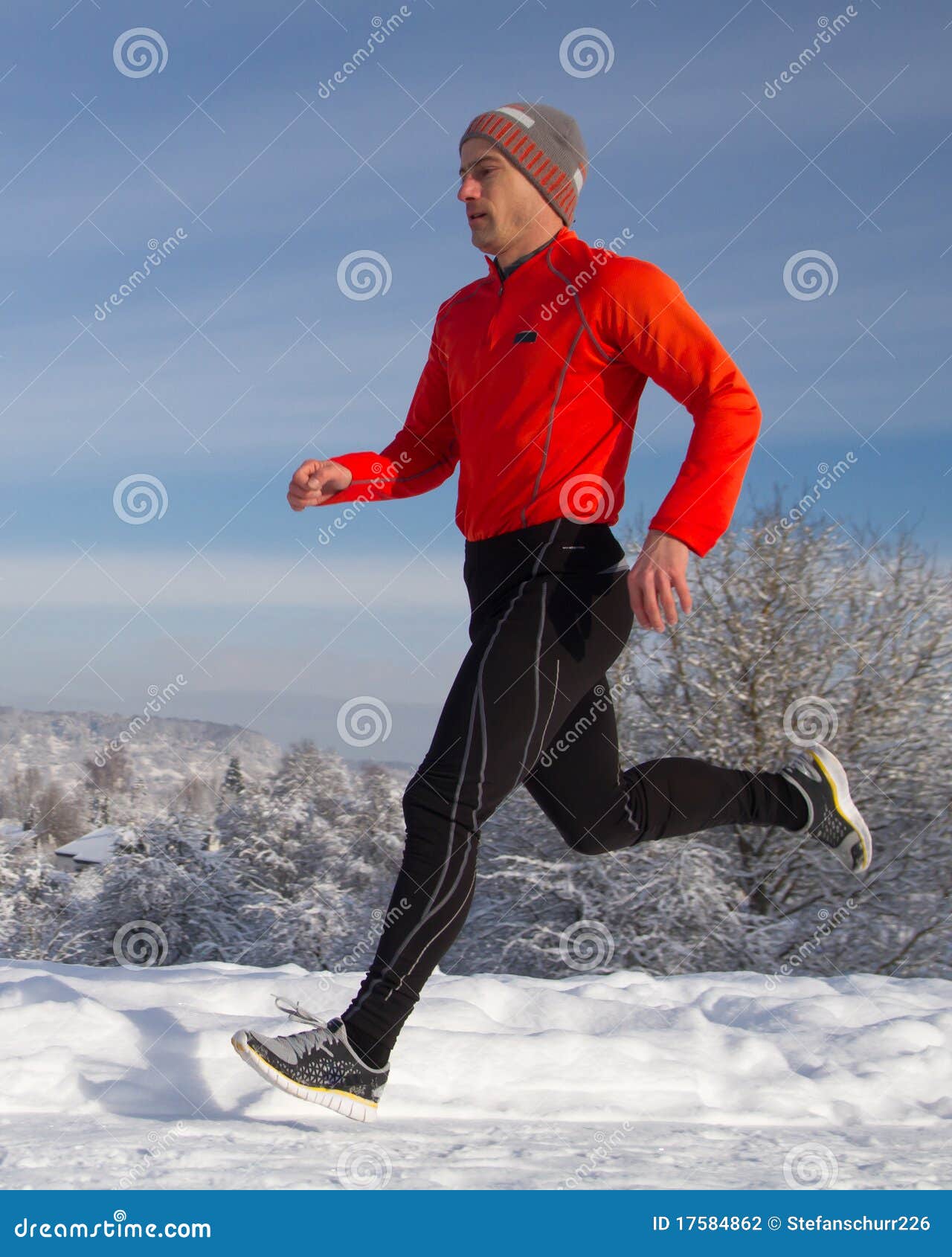 Running Athlete in the Snow Stock Photo - Image of contest, runner ...
