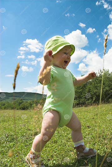 Running baby stock image. Image of running, grass, nature - 10069347