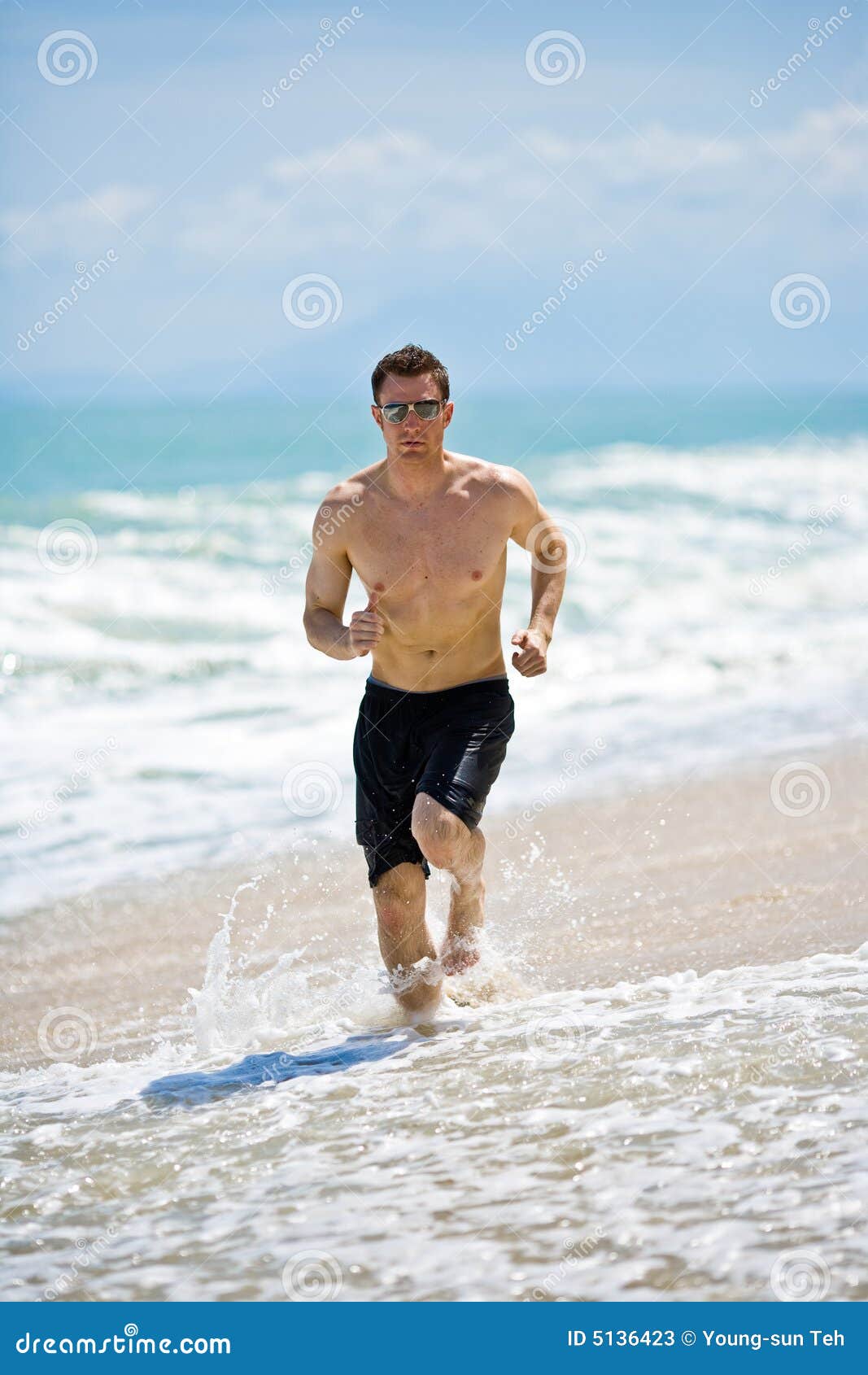 Running at the beach stock image. Image of caucasian, hunk - 5136423