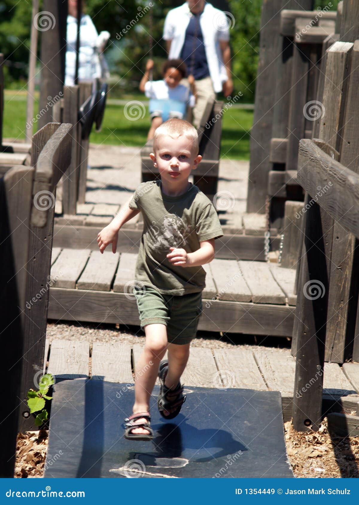 Running Boy on Playground 2 Stock Image - Image of sandals, short: 1354449