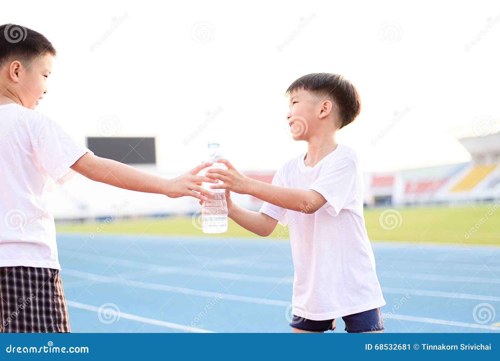 Running boy take water stock image. Image of distance - 68532681